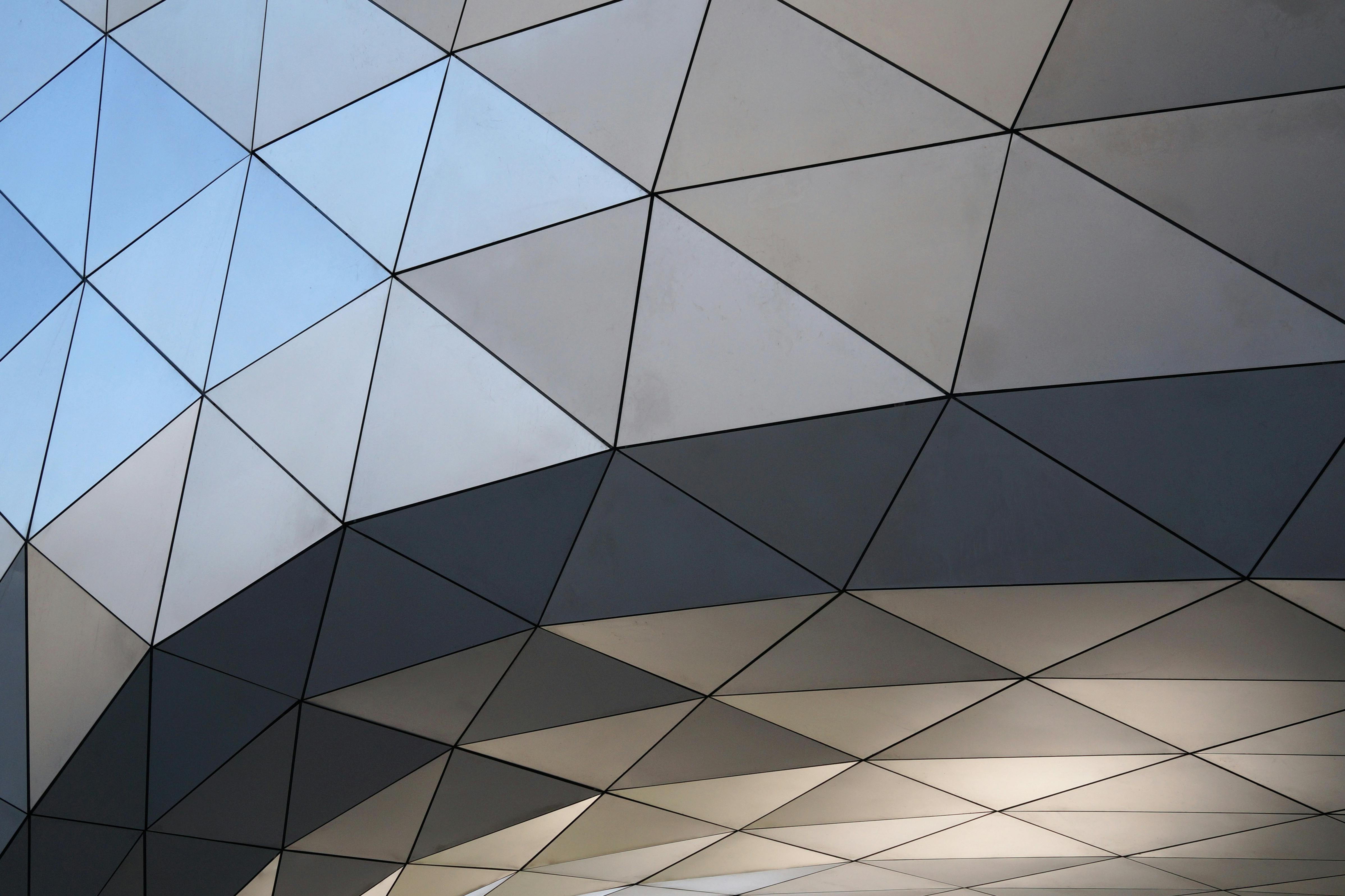 Geometric Architectural Pattern with Triangular Design · Free Stock Photo