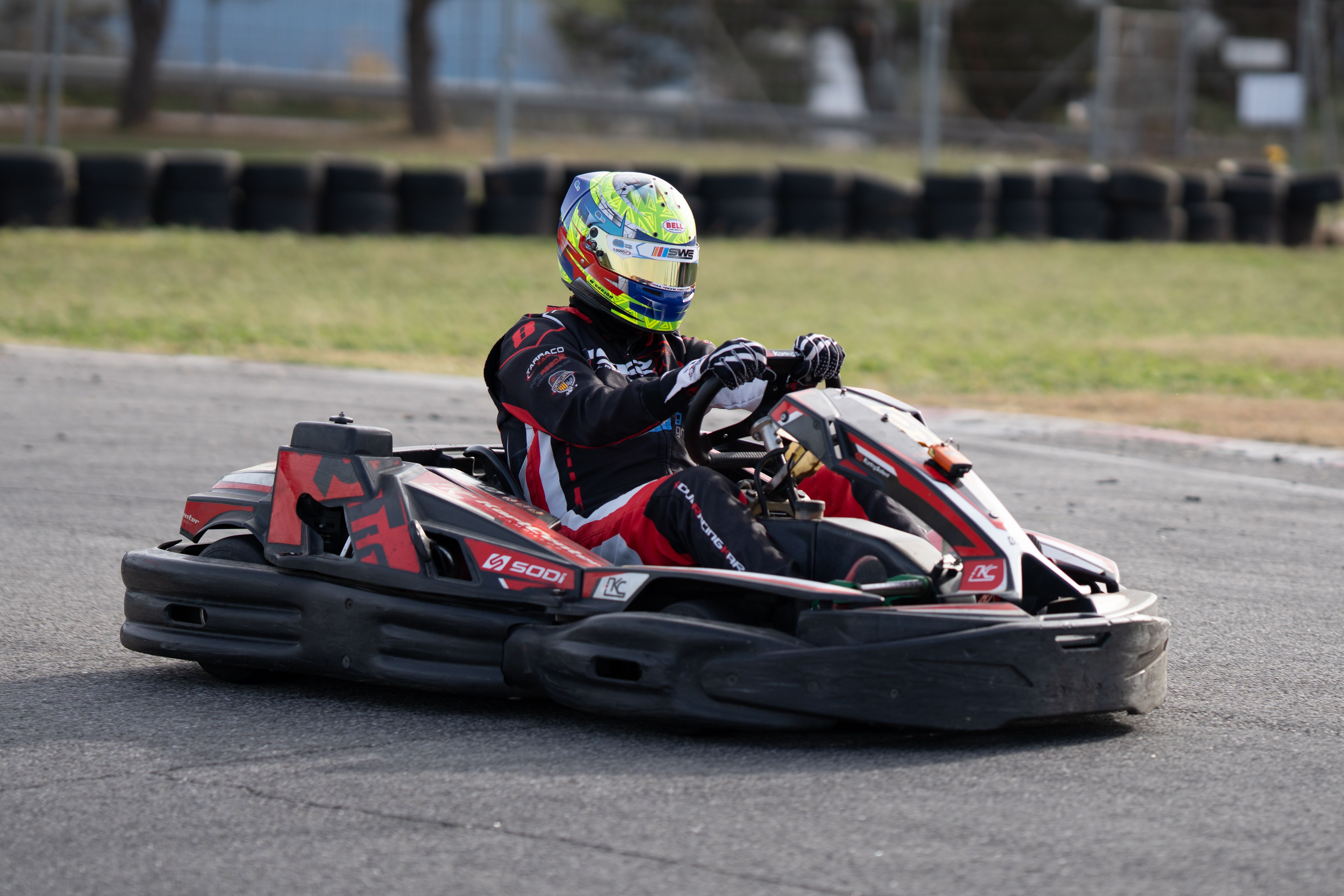 Go-Kart Racer Driving on Outdoor Track · Free Stock Photo