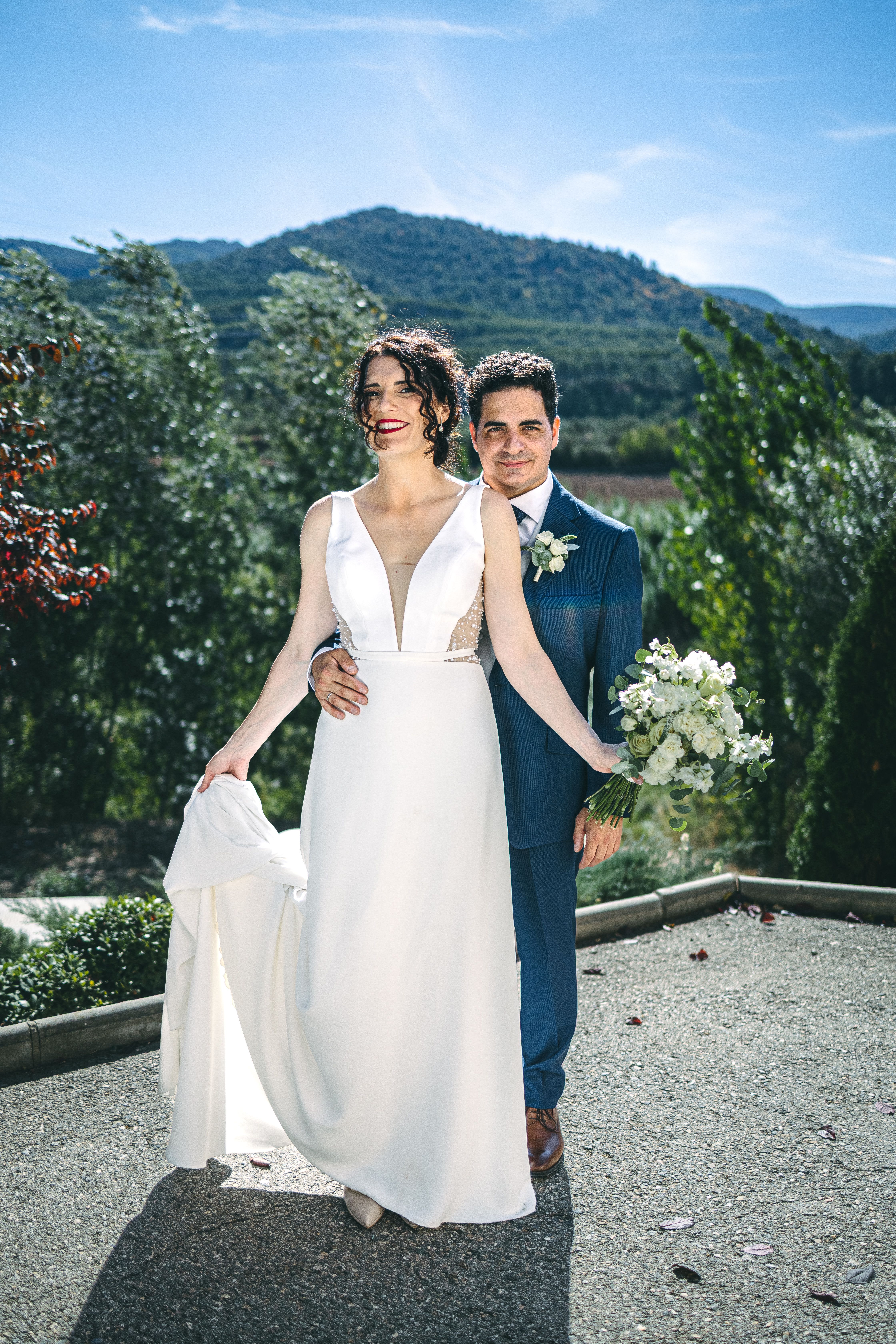 Elegant Outdoor Wedding Portrait with Mountain Views · Free Stock Photo