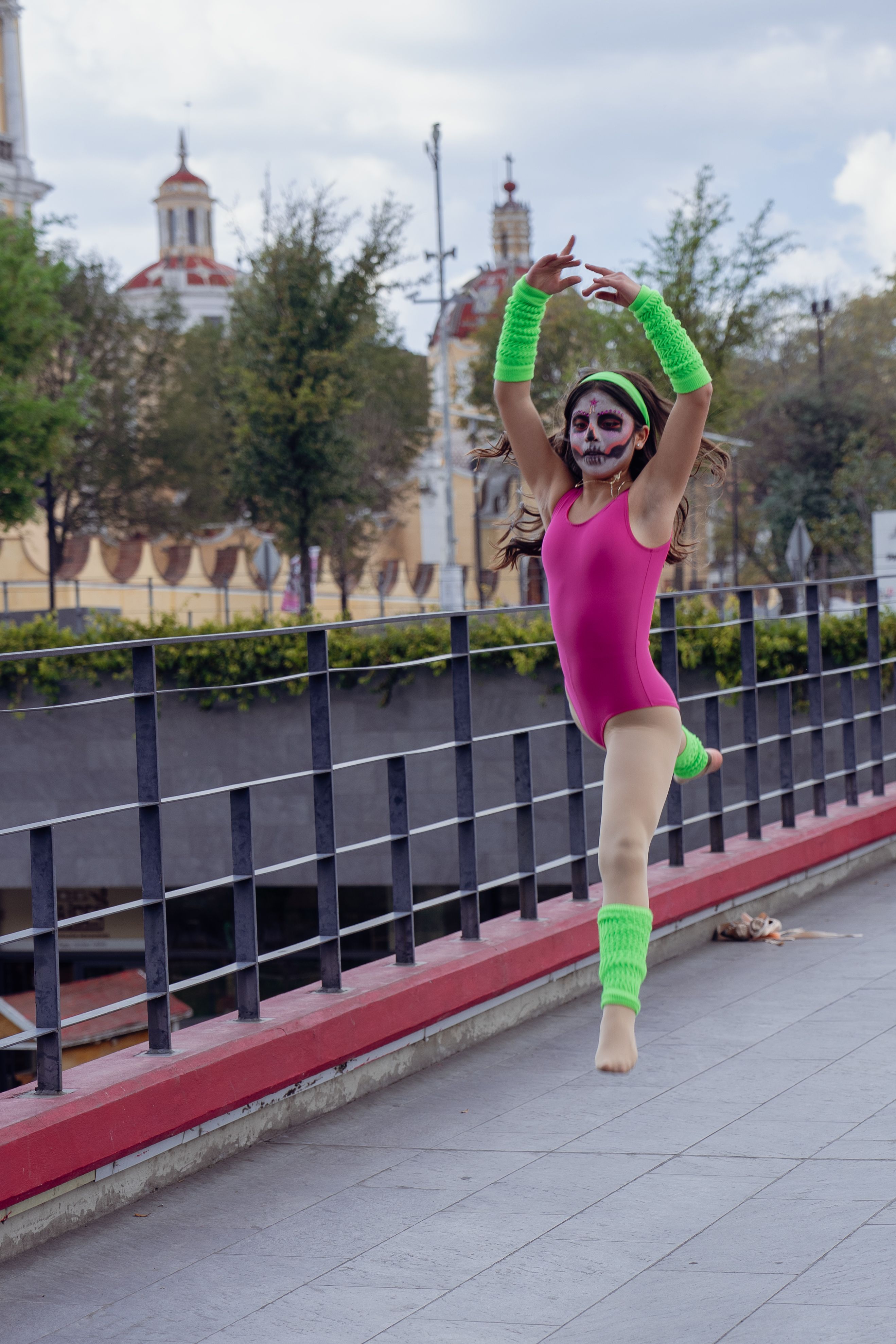 Ballet Dancer In Day Of The Dead Makeup Leaping Outdoors · Free Stock Photo