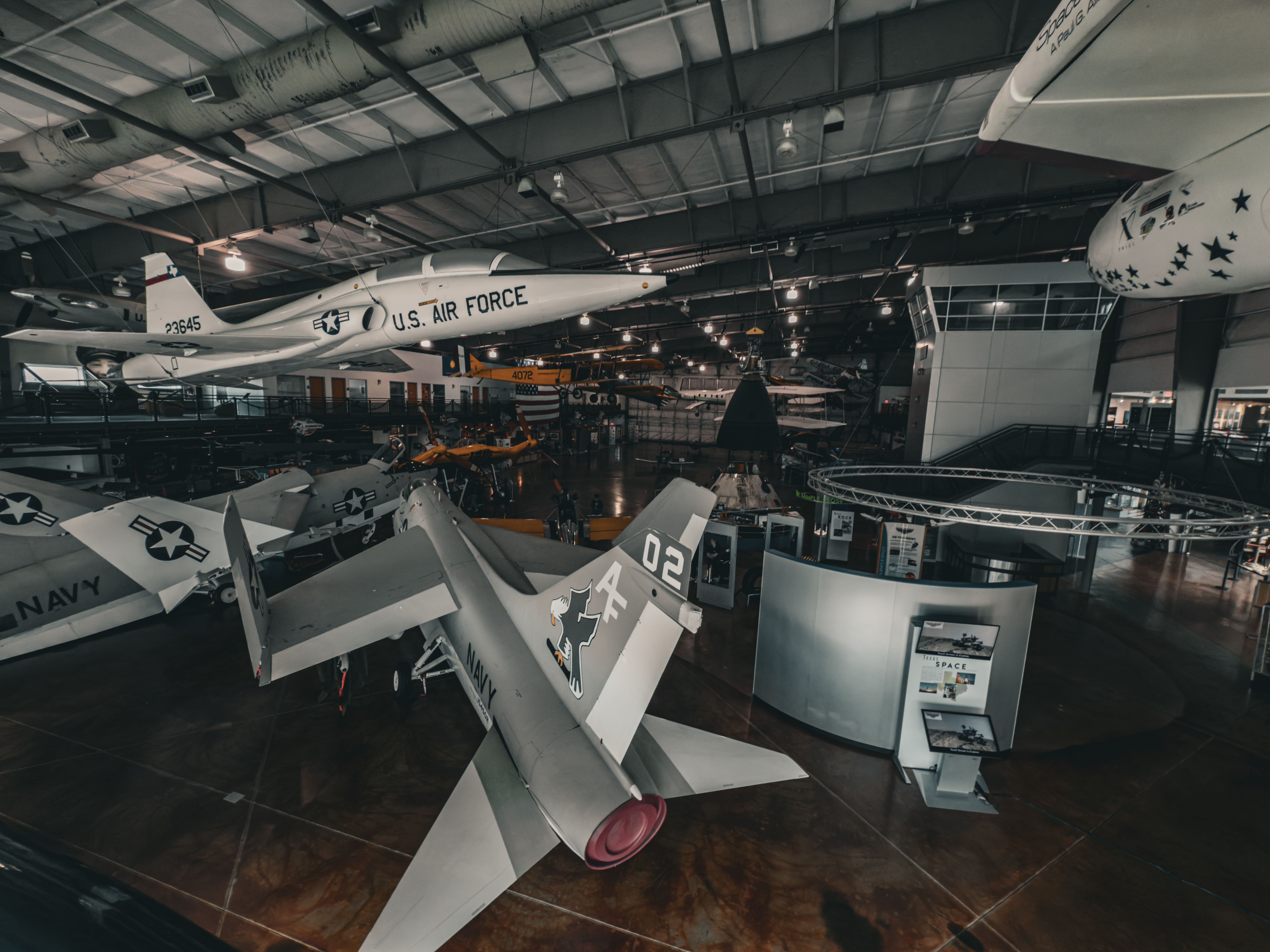 Aviation Museum Exhibit Featuring Historic Aircrafts · Free Stock Photo