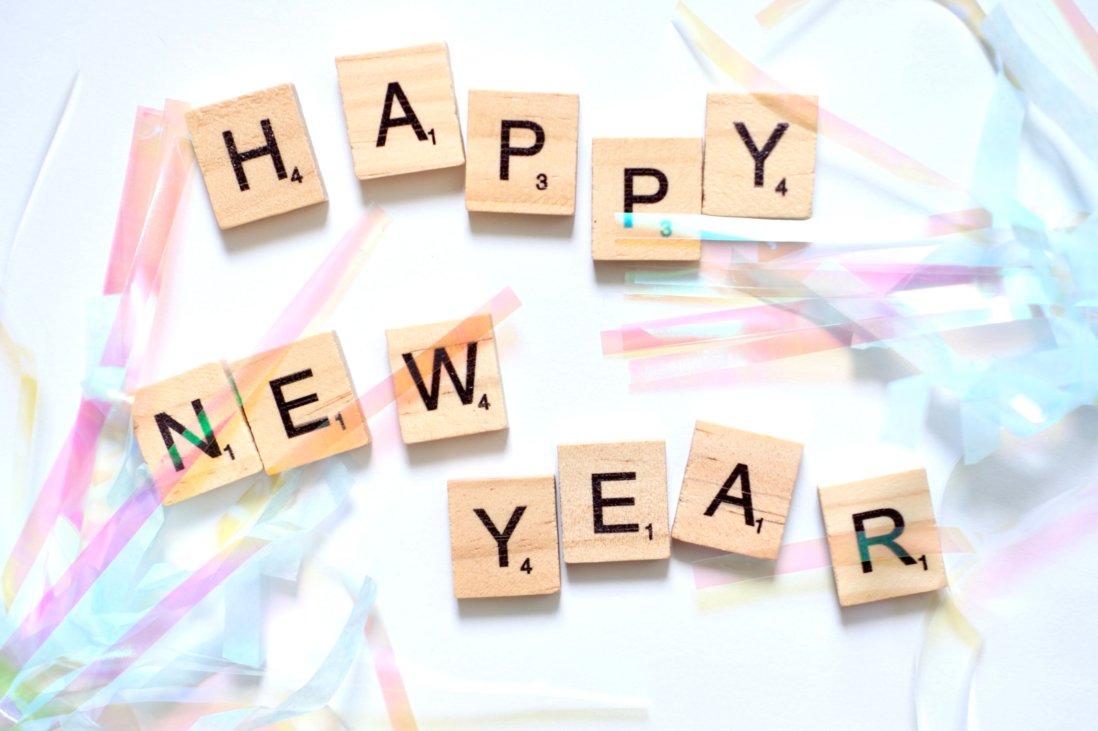 Happy New Year celebration with letter tiles · Free Stock Photo