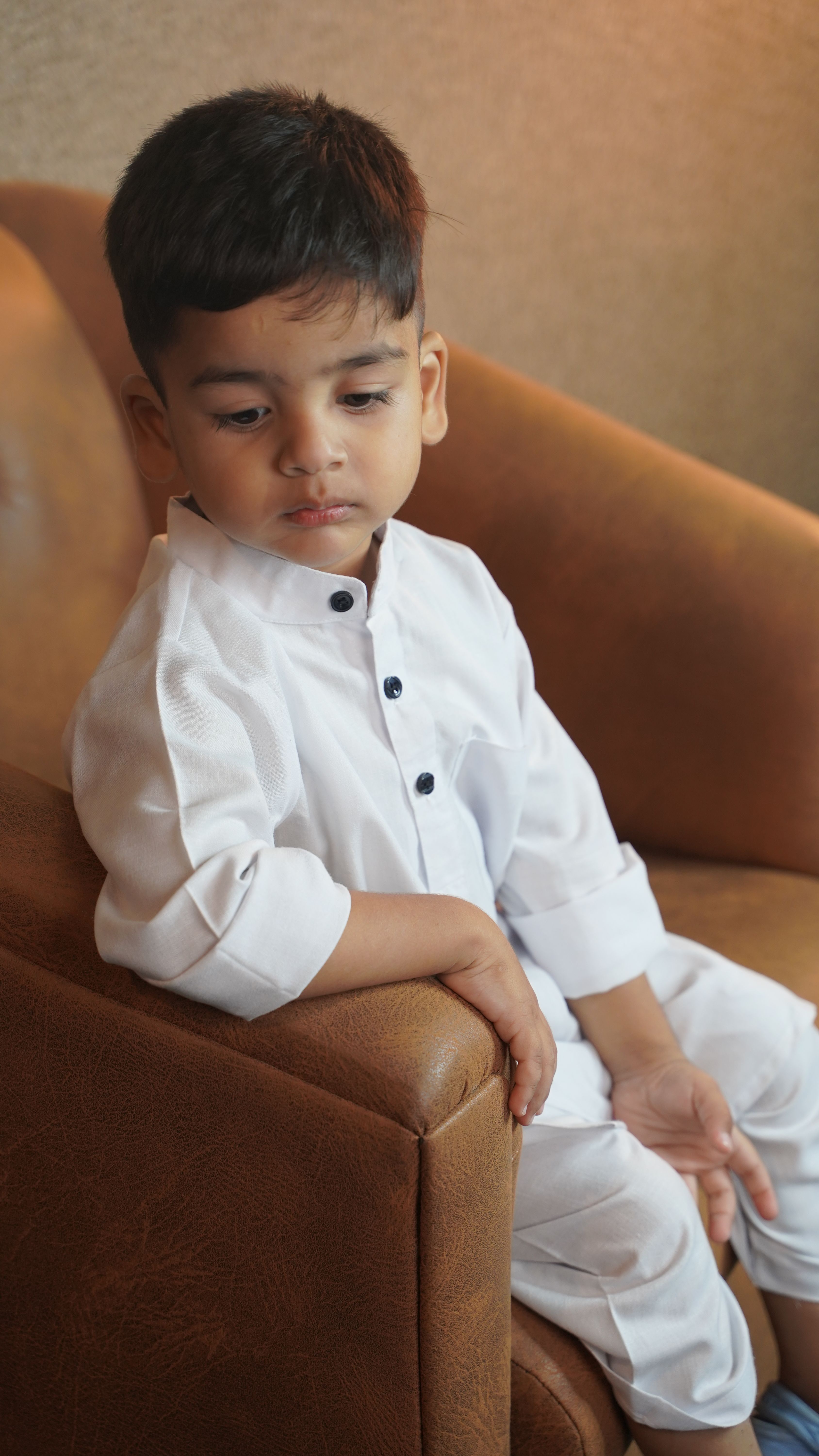 Portrait of a Thoughtful Child in Traditional White Clothing · Free ...