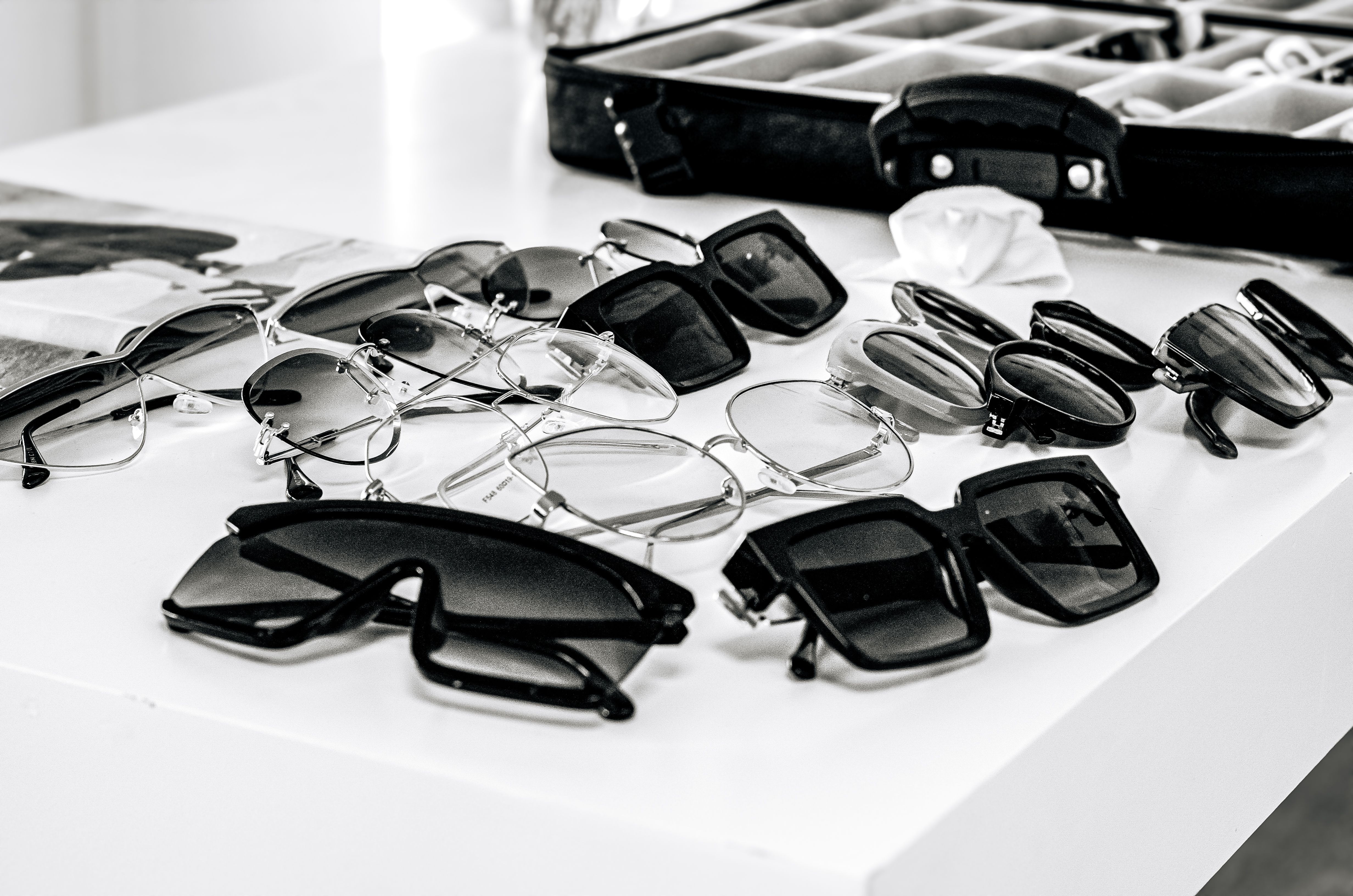 Stylish Sunglasses and Eyeglasses Close-Up · Free Stock Photo