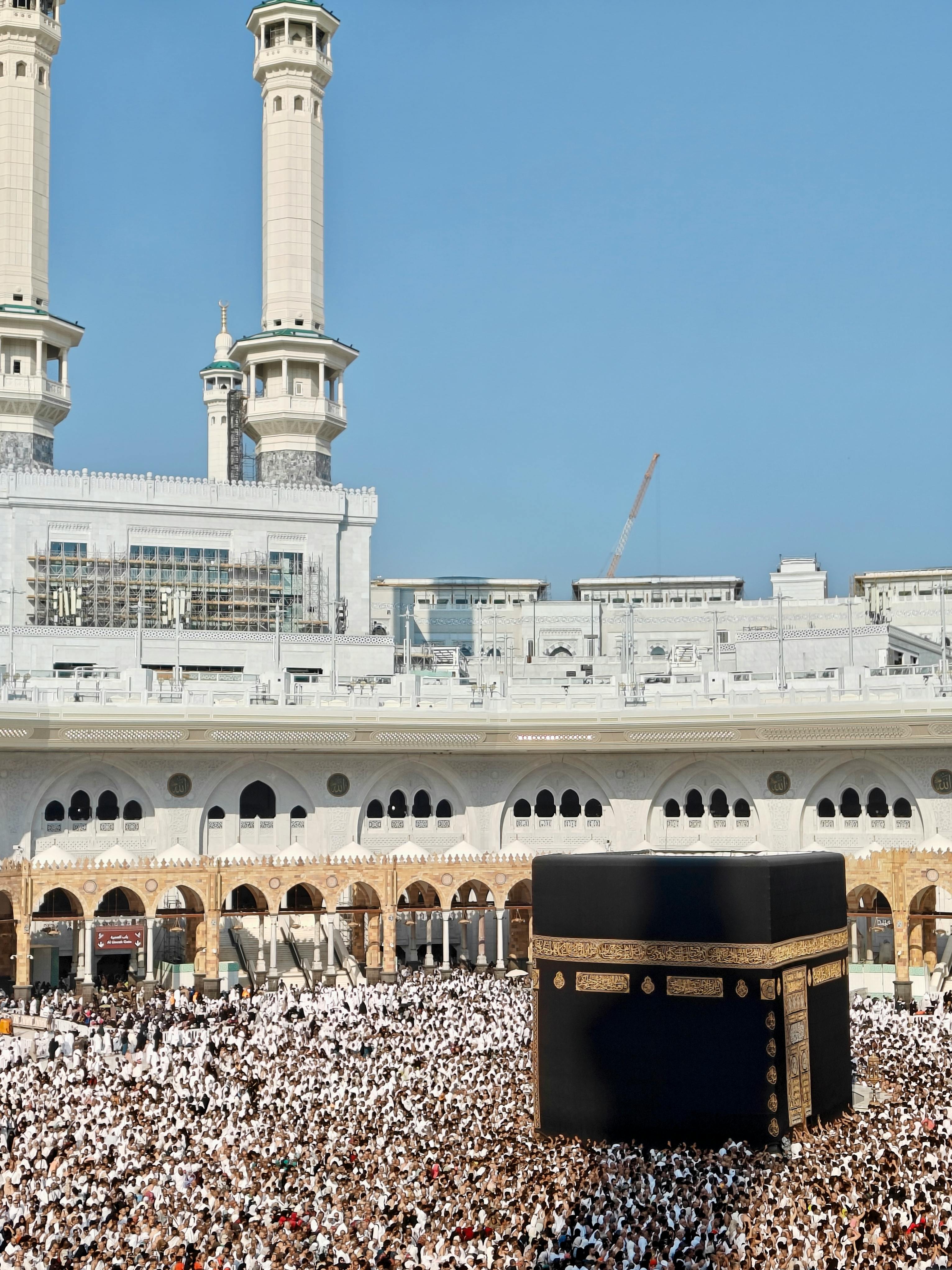 Kaaba in Mecca with Grand Mosque Towers · Free Stock Photo