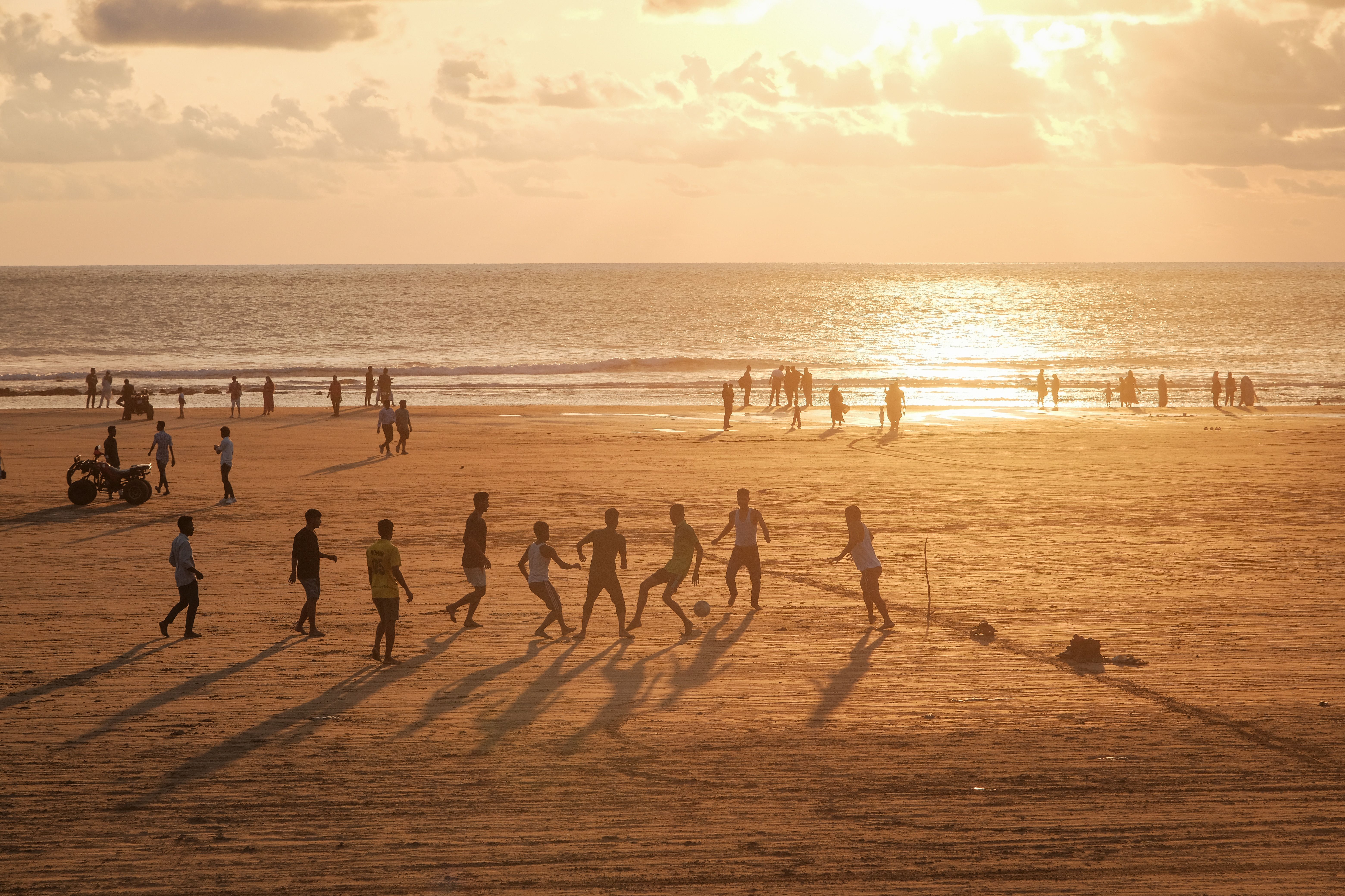 Beach Football at Sunset in Cox's Bazar · Free Stock Photo