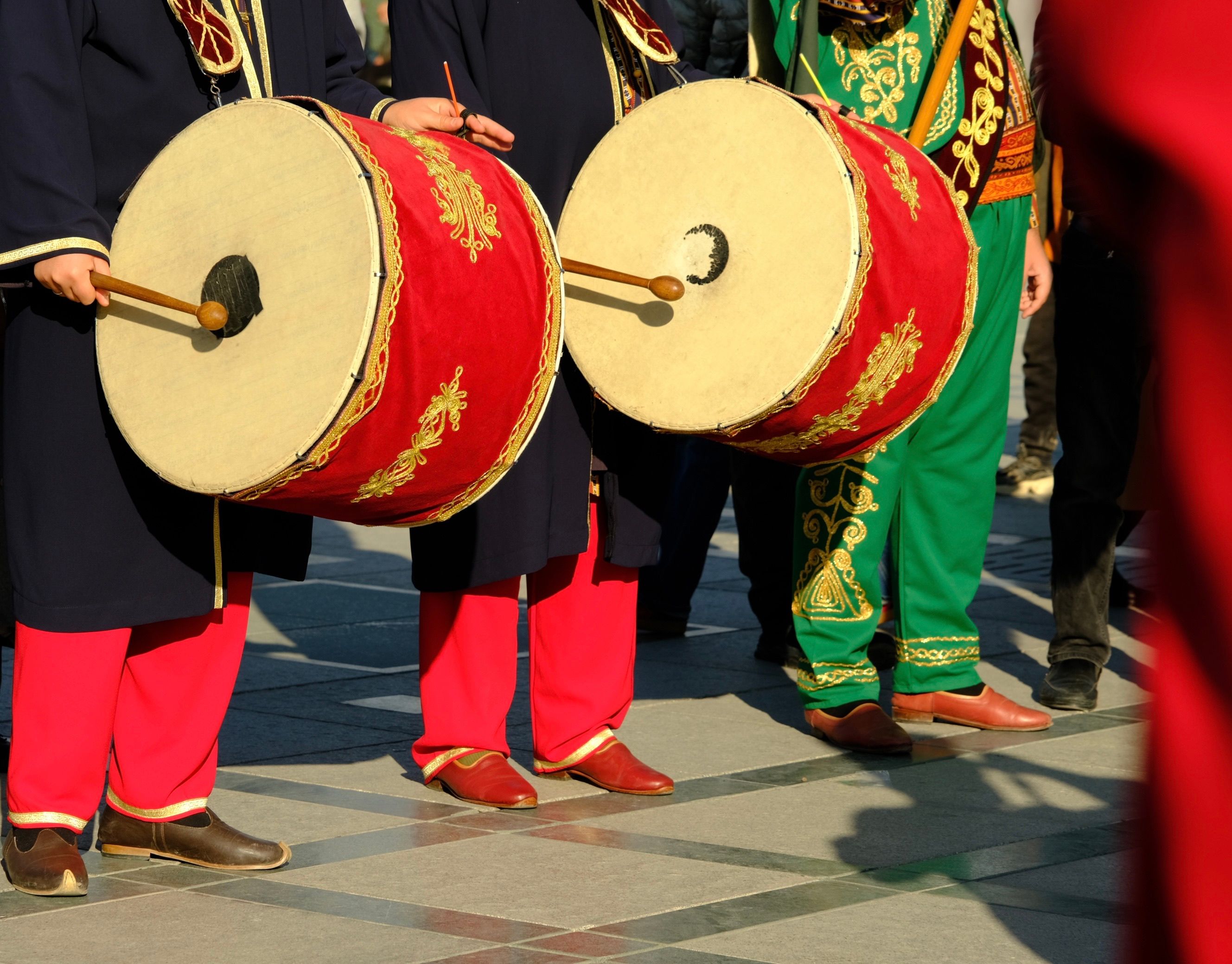 Traditional Drummers in Cultural Attire Outdoors · Free Stock Photo