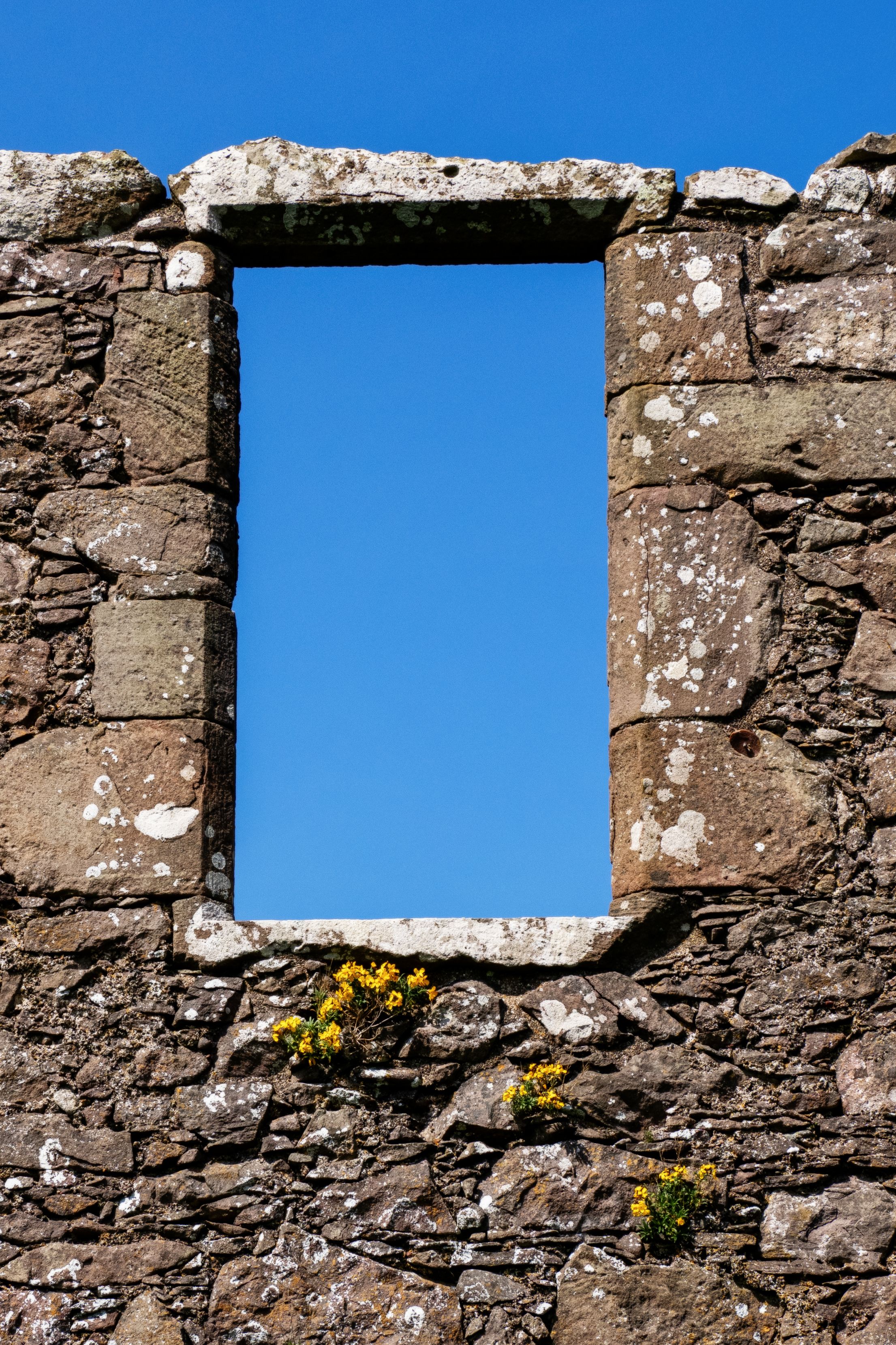 Historic Stone Window Frame with Blue Sky · Free Stock Photo