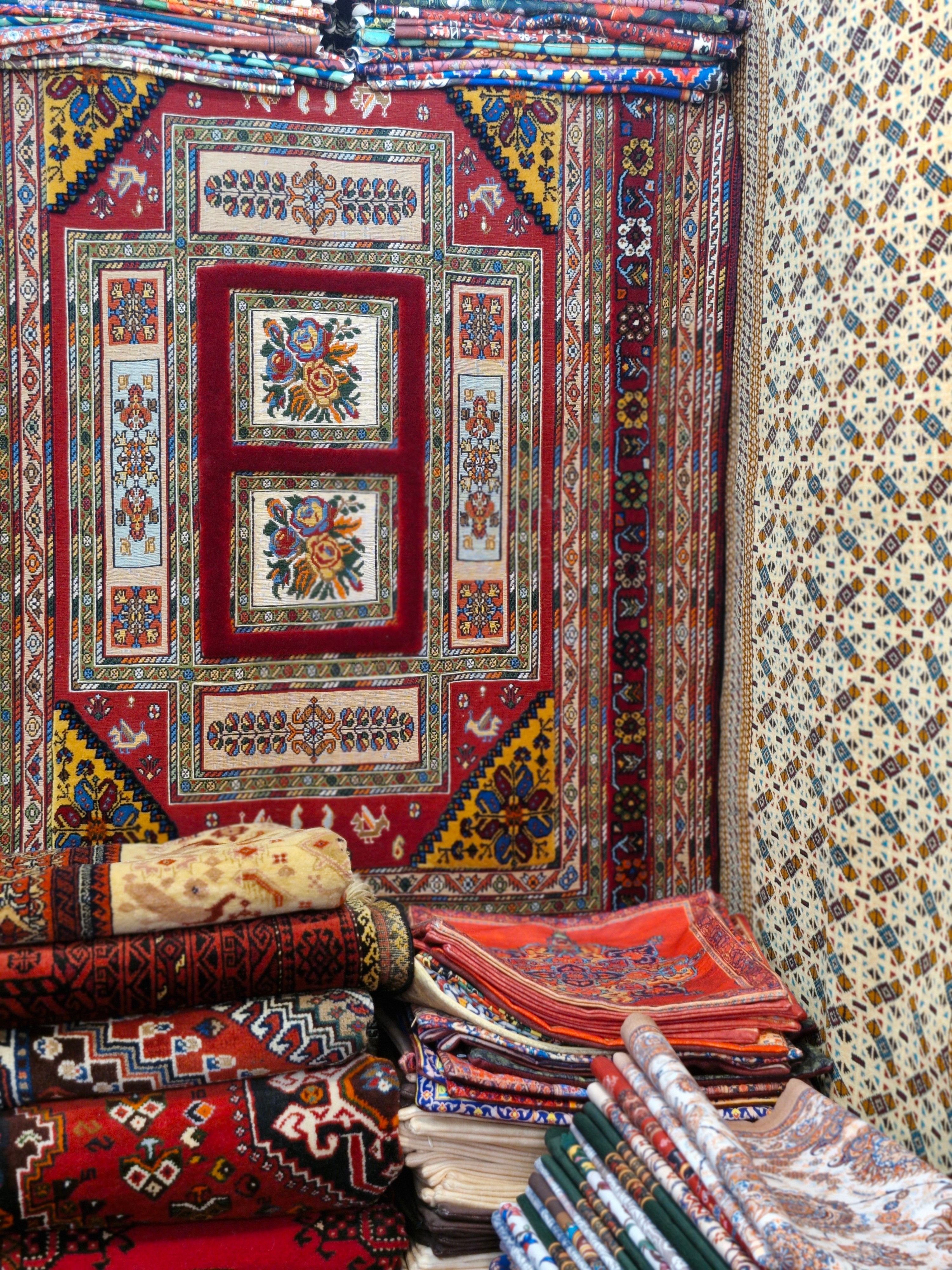 Handmade Colorful Rugs on a Market · Free Stock Photo