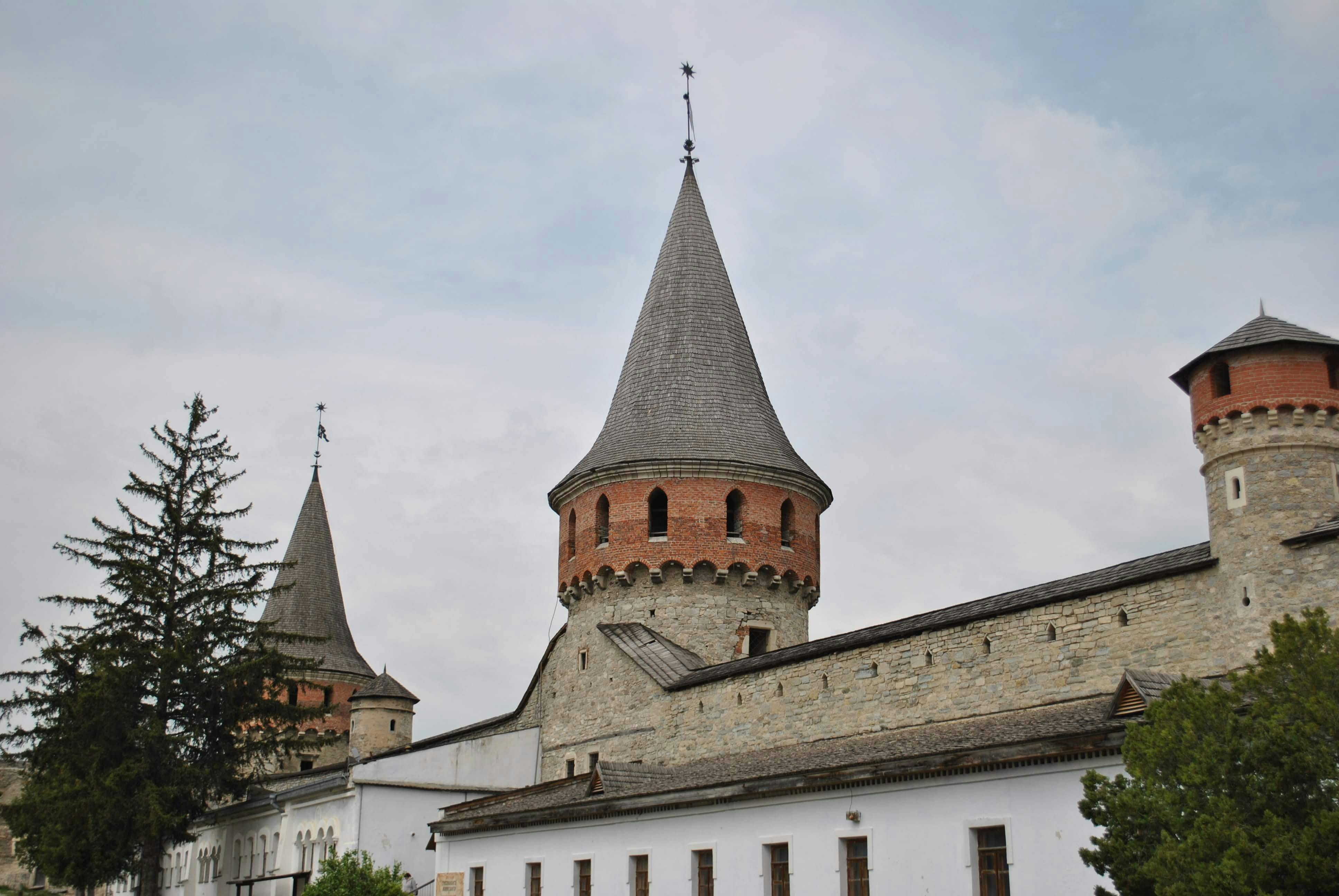 Historic Medieval Castle Towers Against Sky · Free Stock Photo