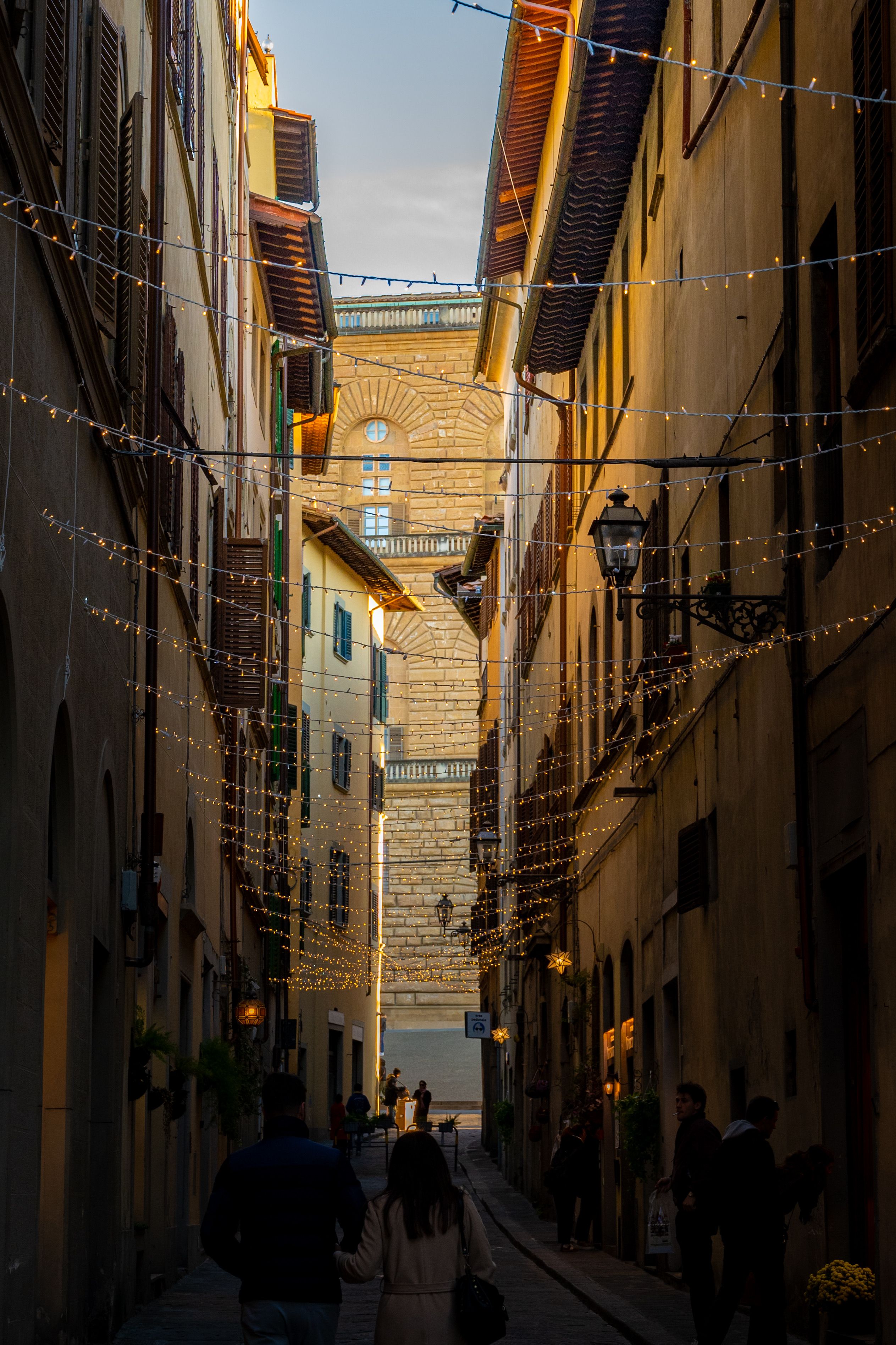 Charming Evening Street Scene with Festive Lights · Free Stock Photo