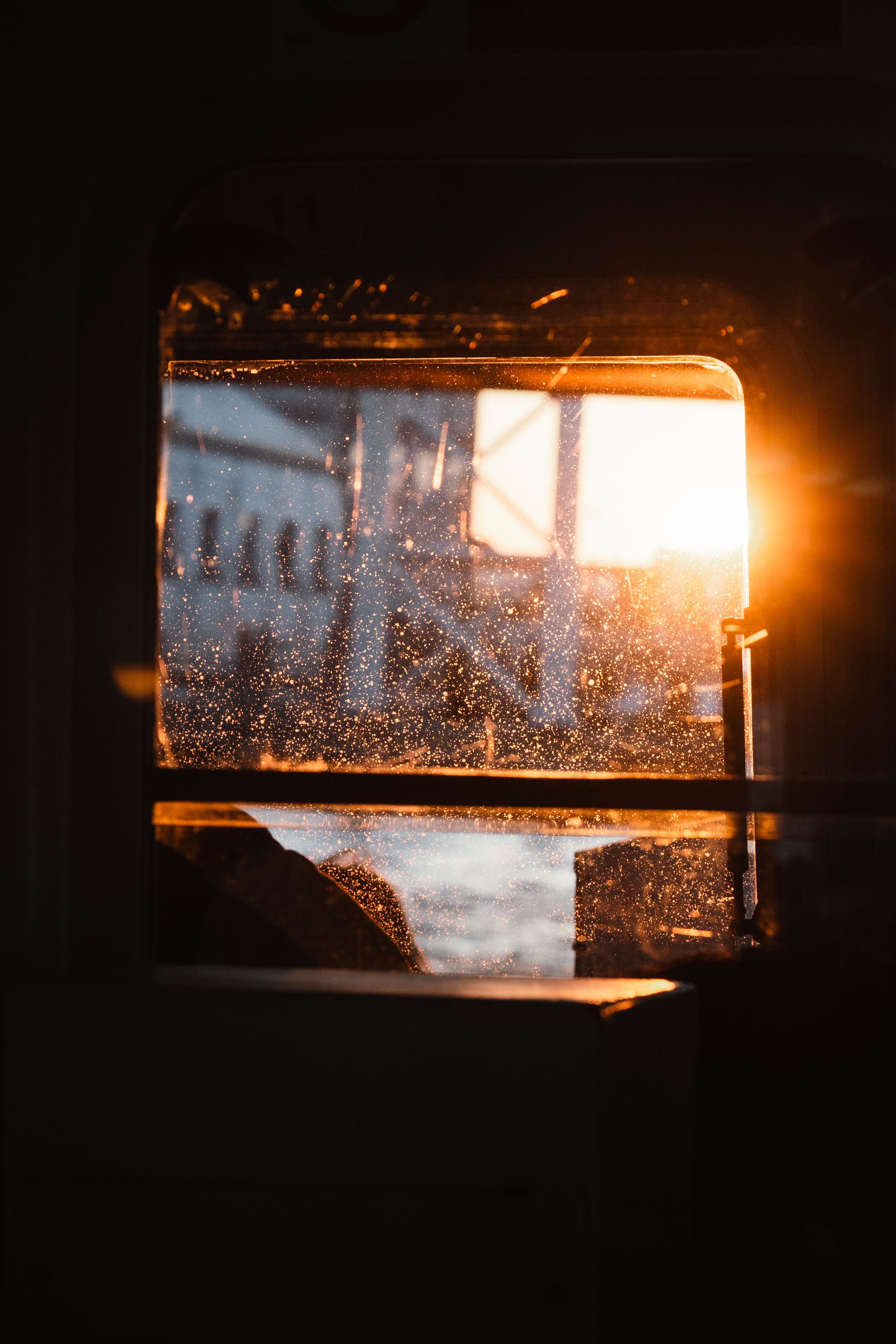Sunset View through a Ferry Window with Warm Light · Free Stock Photo