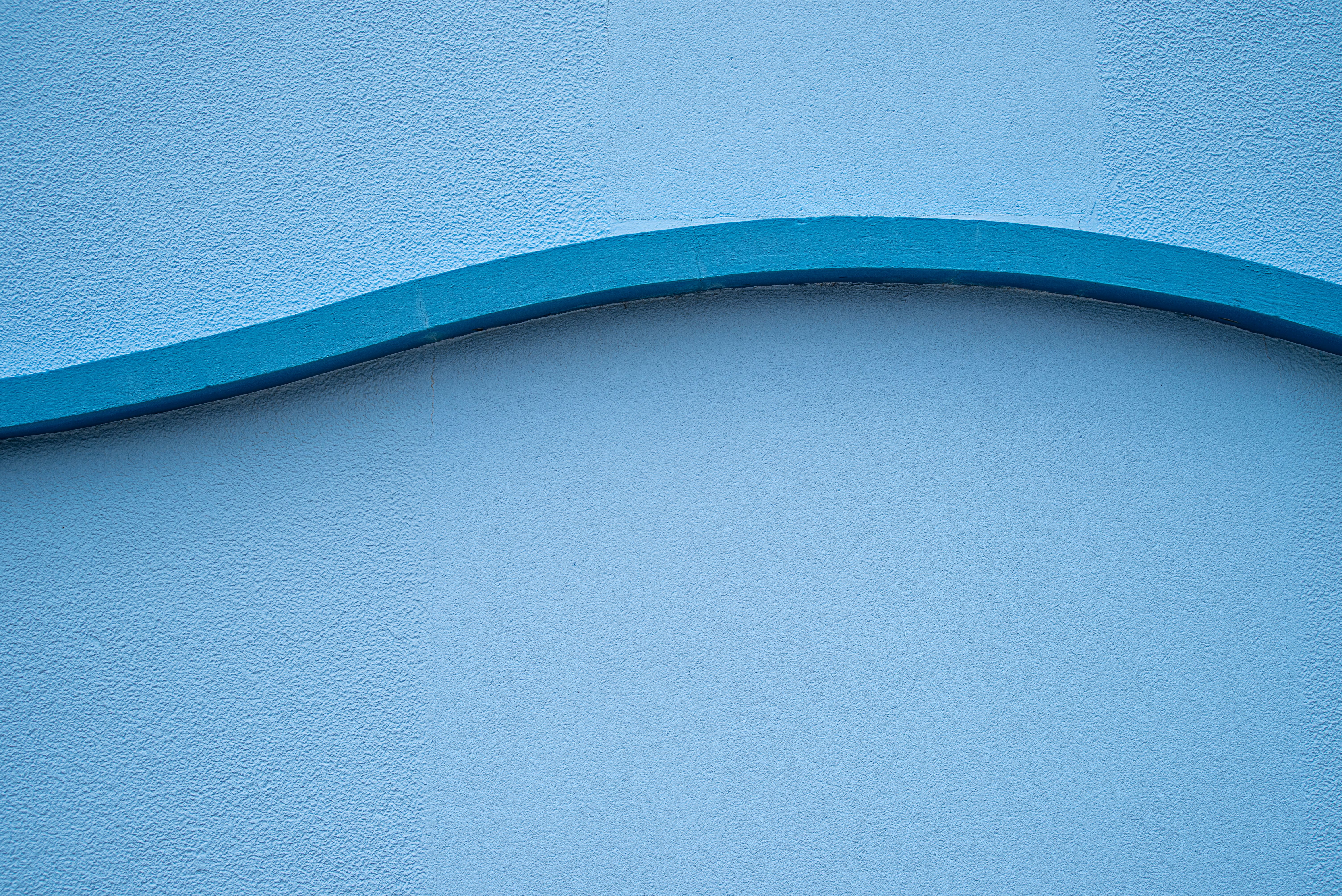 Minimalist Blue Wave Texture on Wall · Free Stock Photo