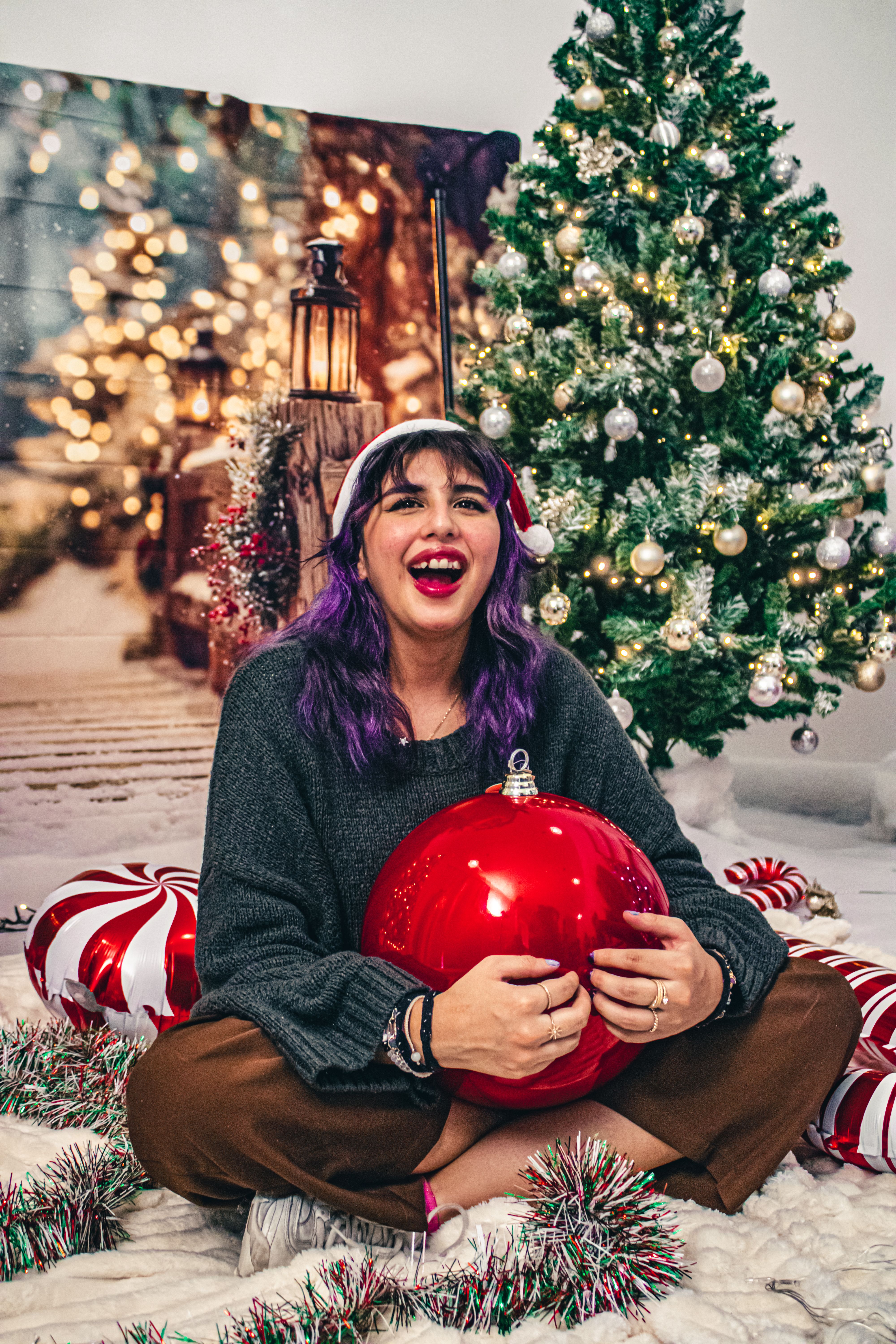 Festive Christmas Portrait with Holiday Decorations · Free Stock Photo