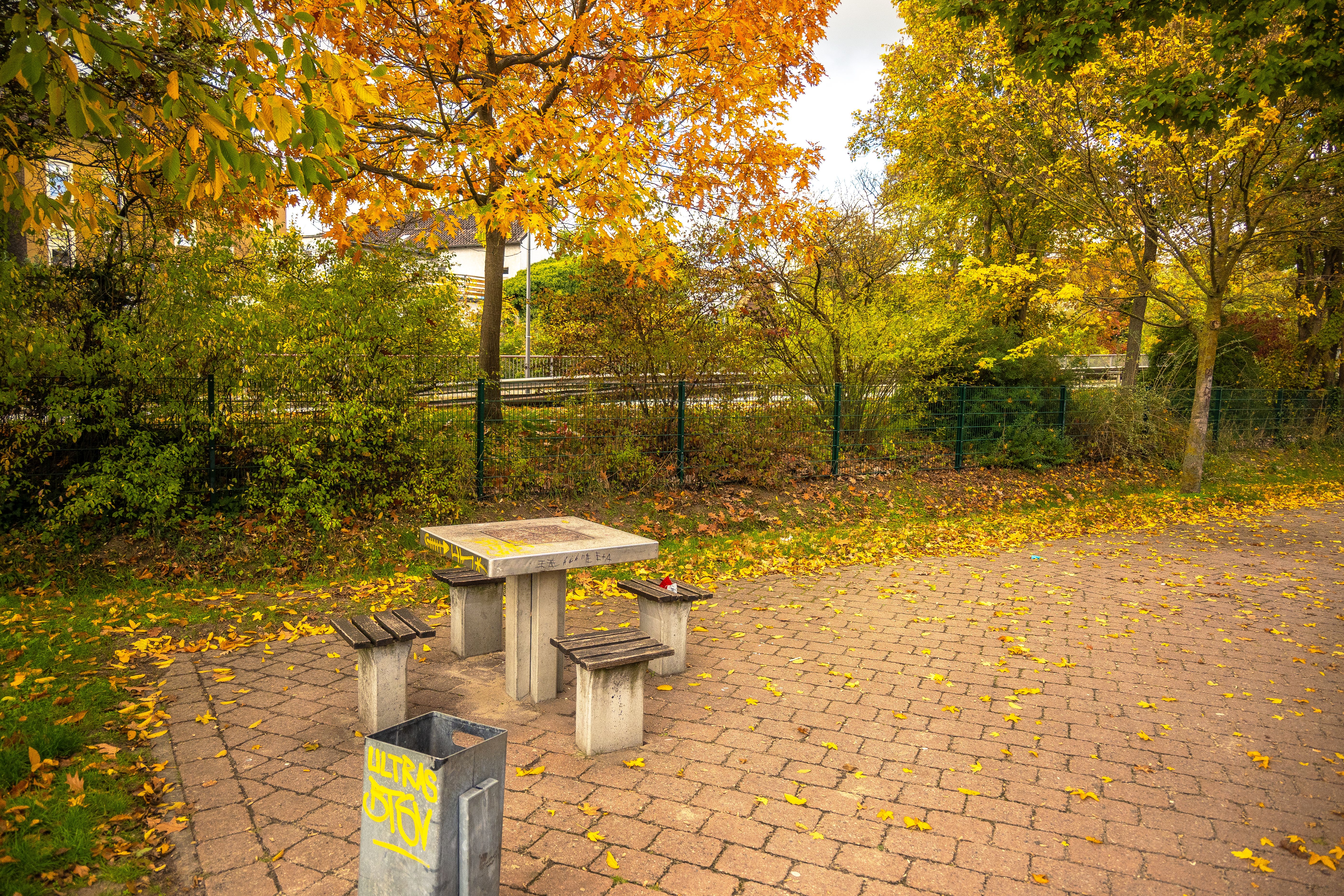 Charming Autumn Scene in German Park Setting · Free Stock Photo