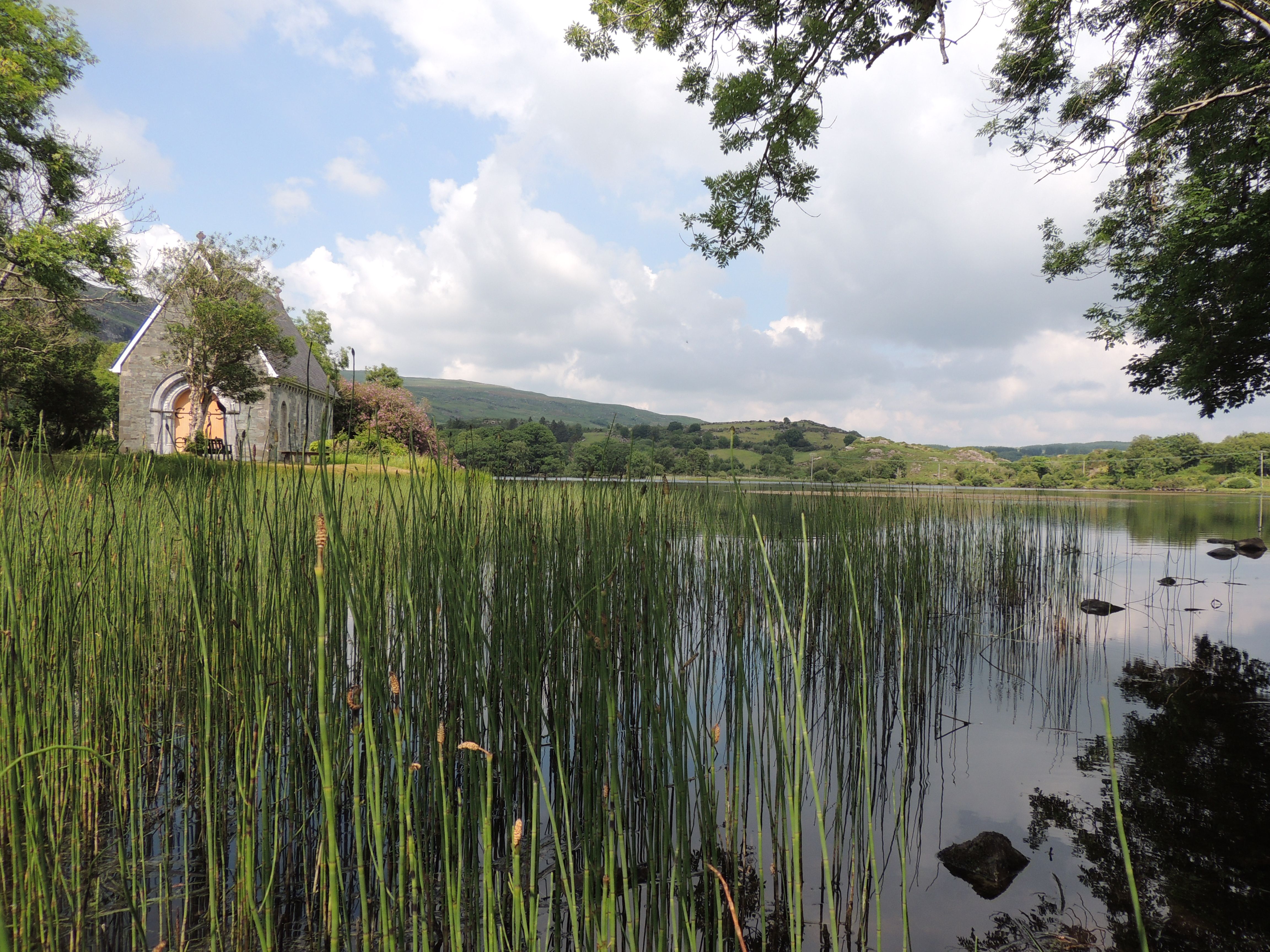 Scenic Lake View with Stone Chapel in Ireland · Free Stock Photo