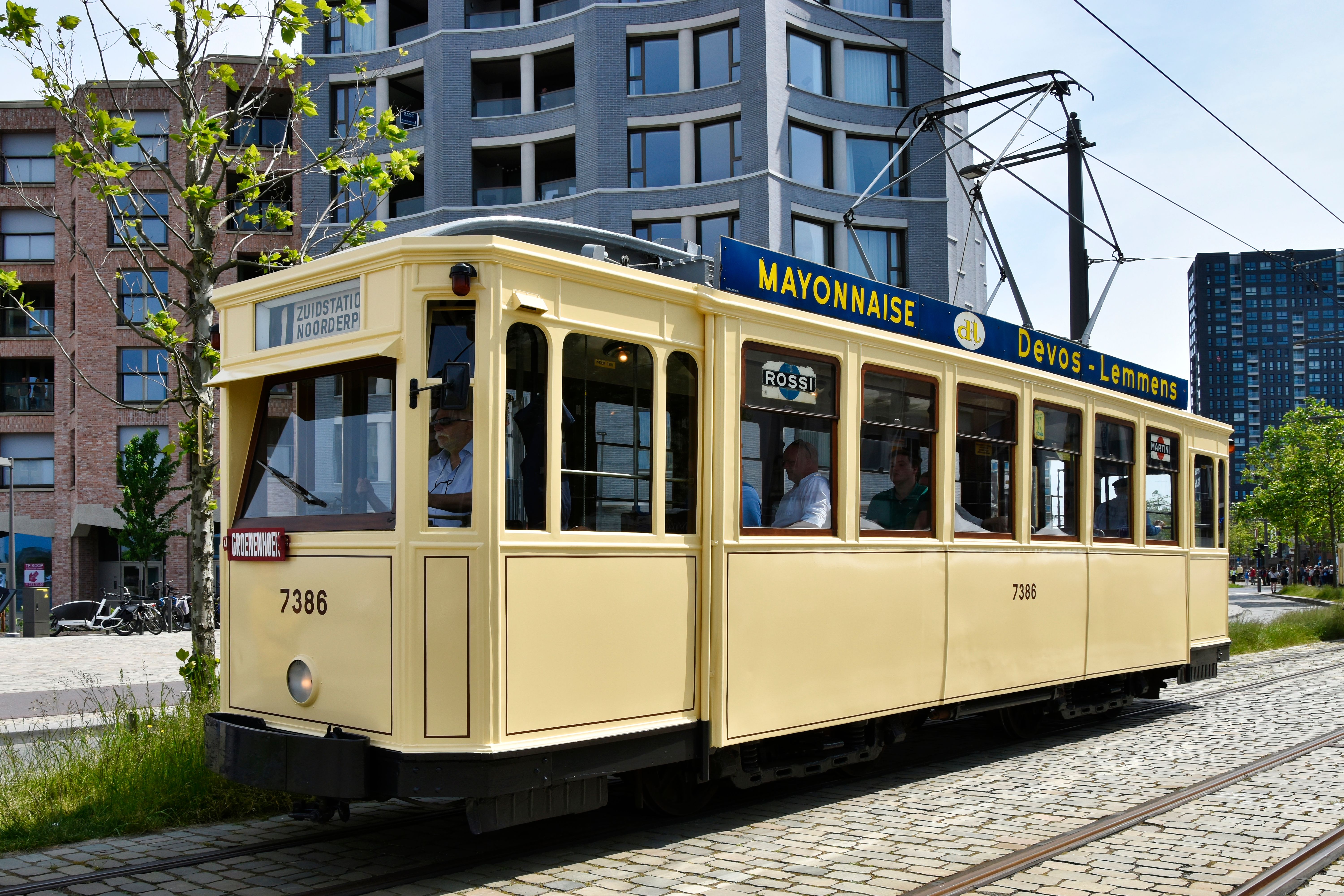 Historic Tram in Antwerp's Modern Urban Setting · Free Stock Photo