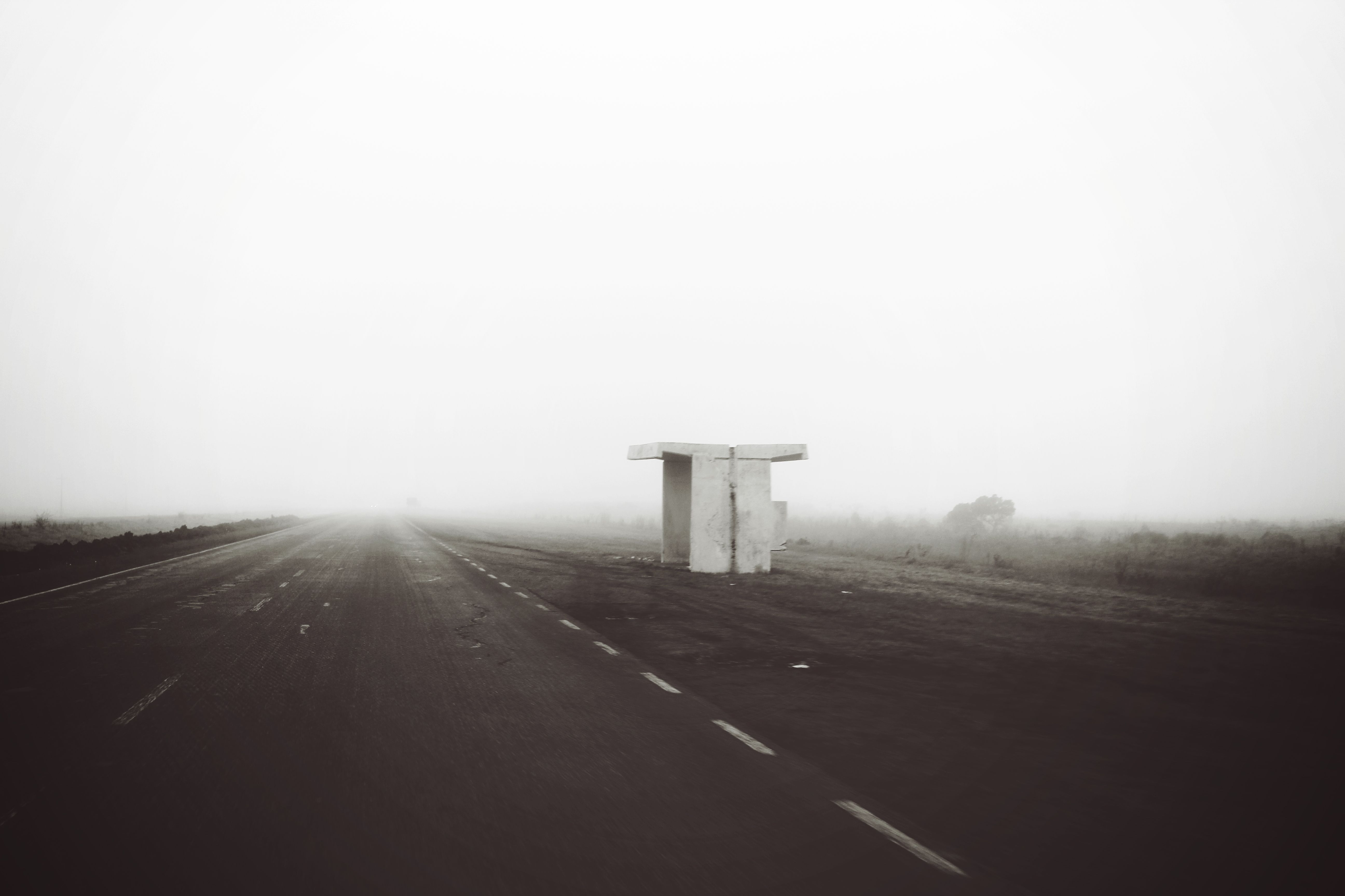 Desolate Road with Foggy Landscape Scene · Free Stock Photo