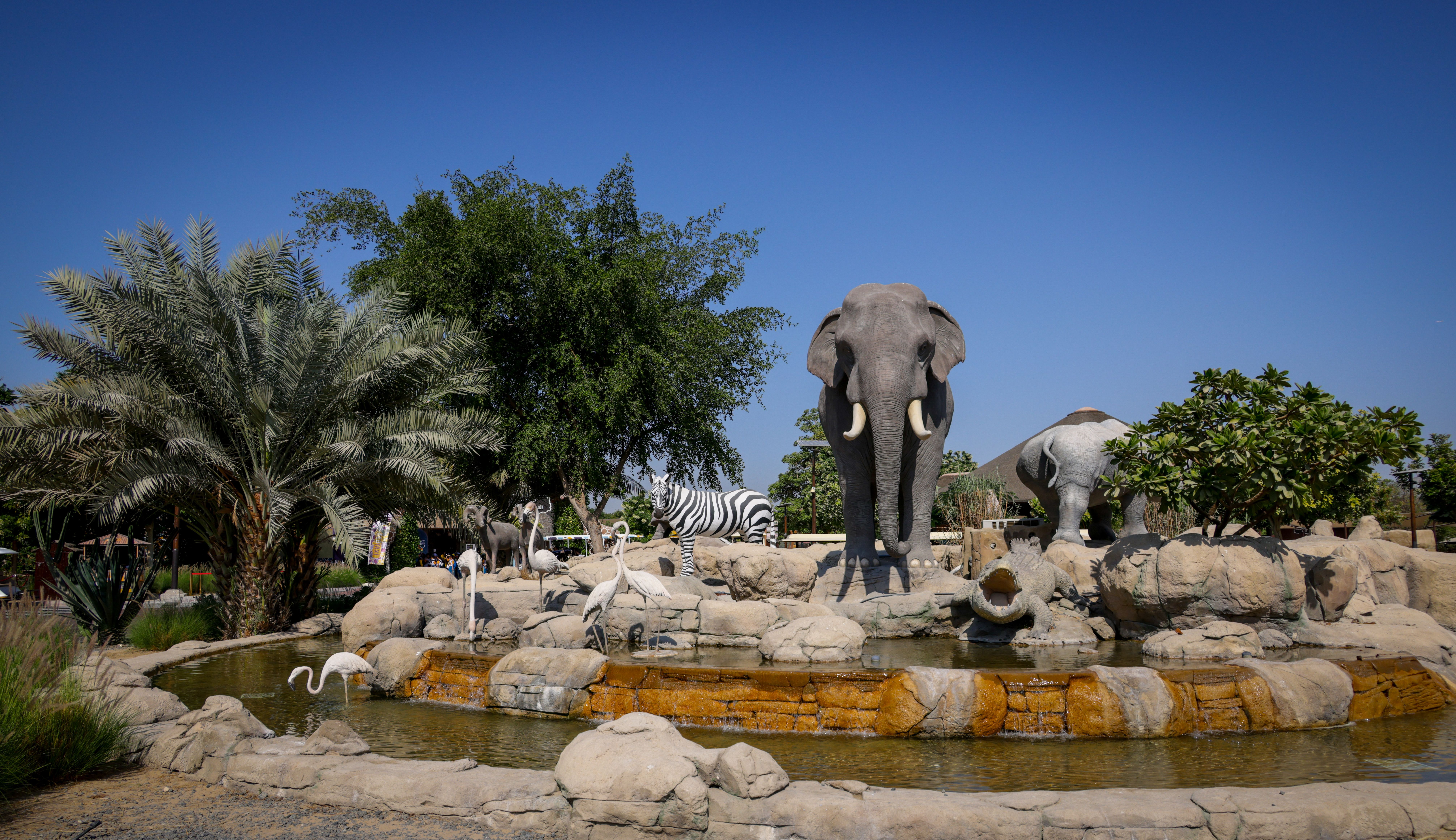 Animal Statues in Outdoor Zoo Exhibit · Free Stock Photo