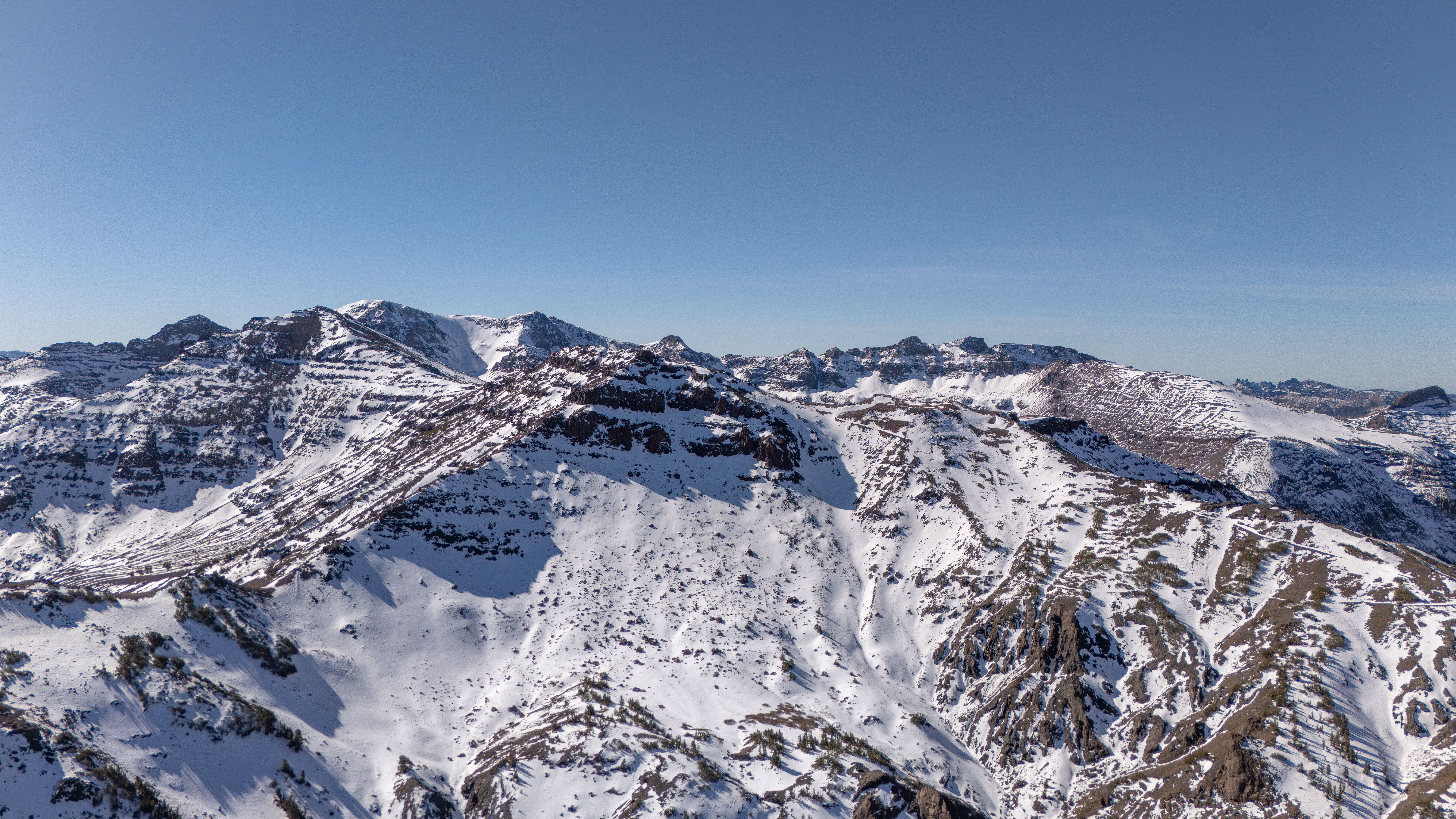 Stunning Aerial View of Snow-Capped Sierra Nevada · Free Stock Photo