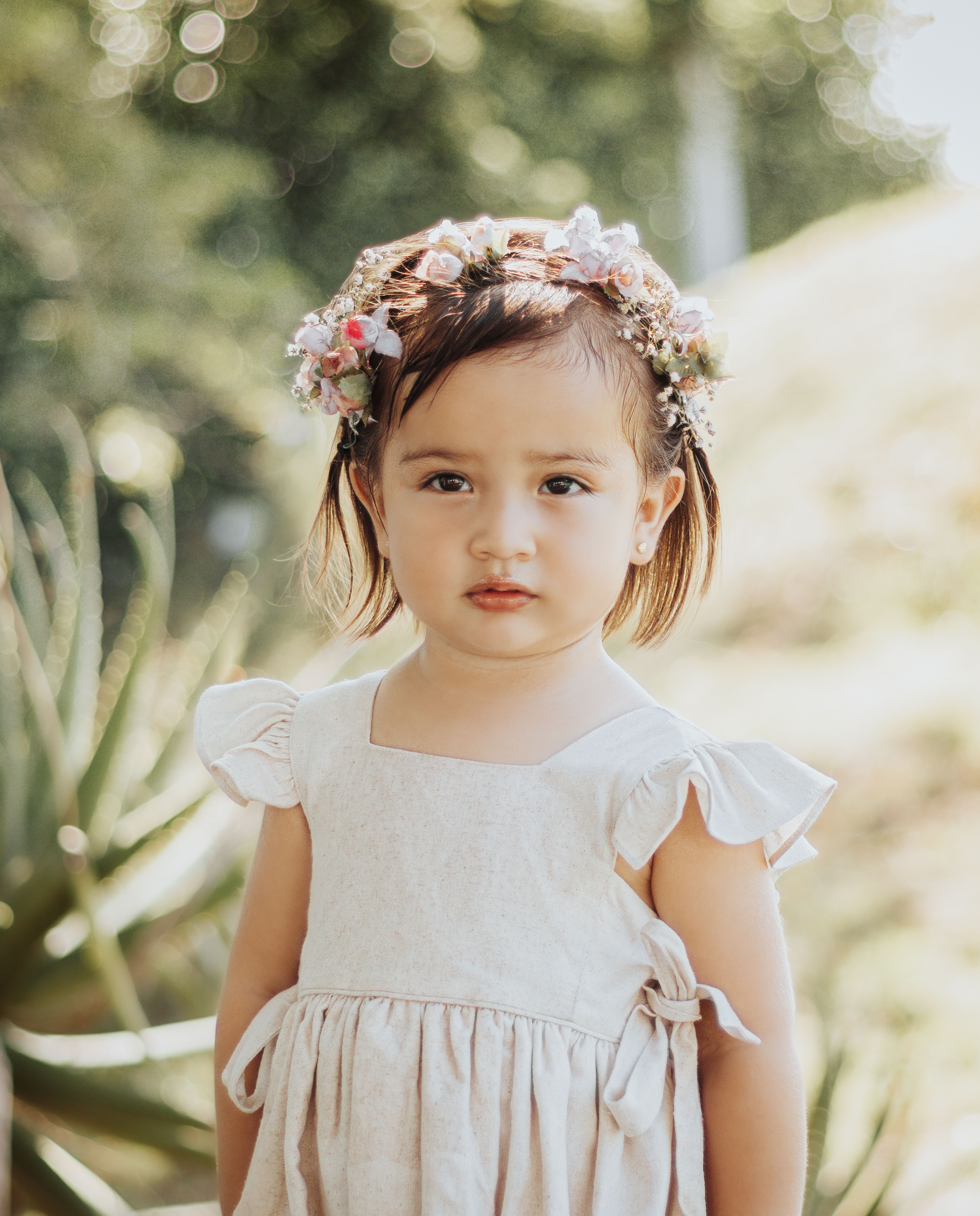 Adorable Child with Flower Crown Outdoors · Free Stock Photo