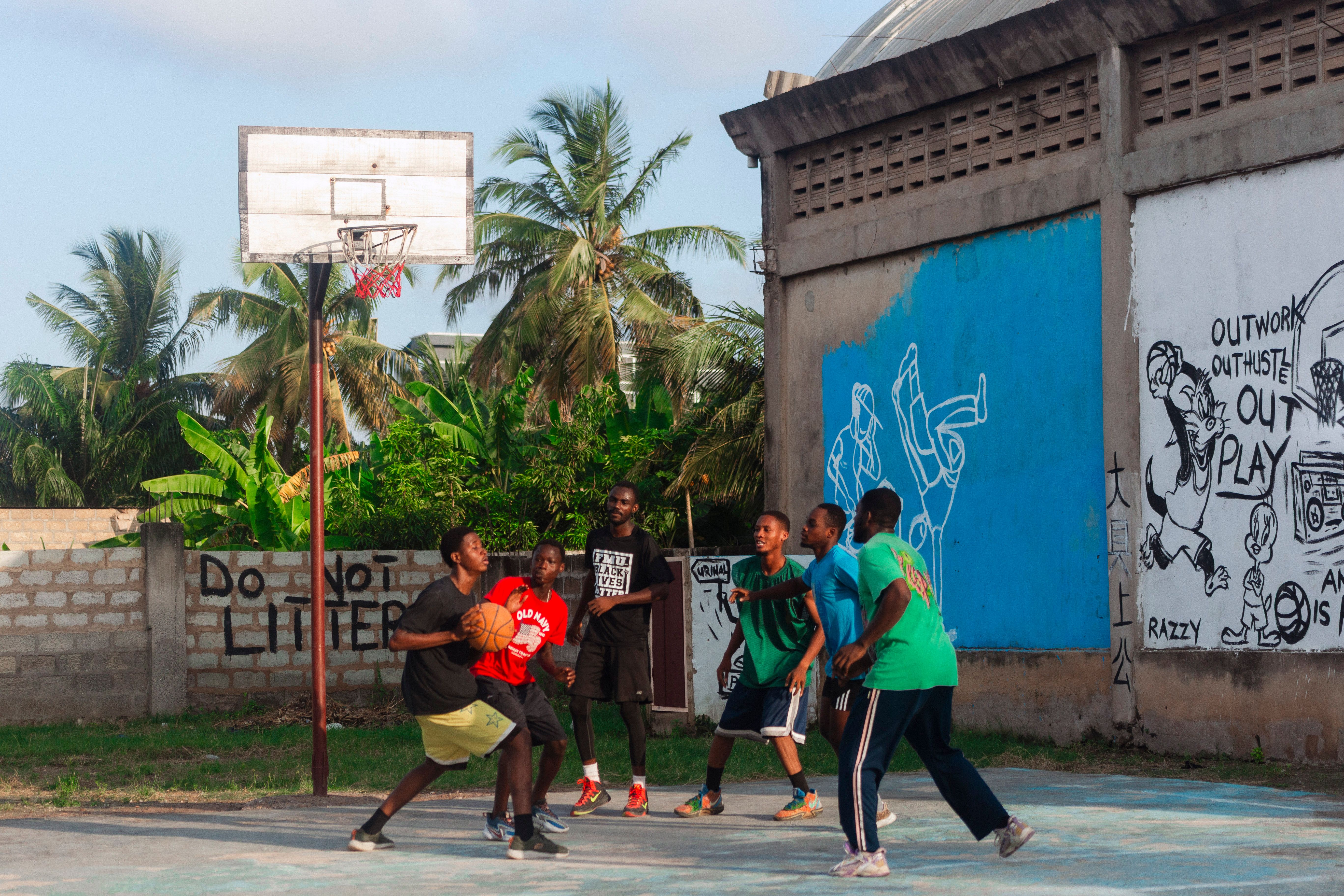 Outdoor Basketball Game on Urban Court · Free Stock Photo