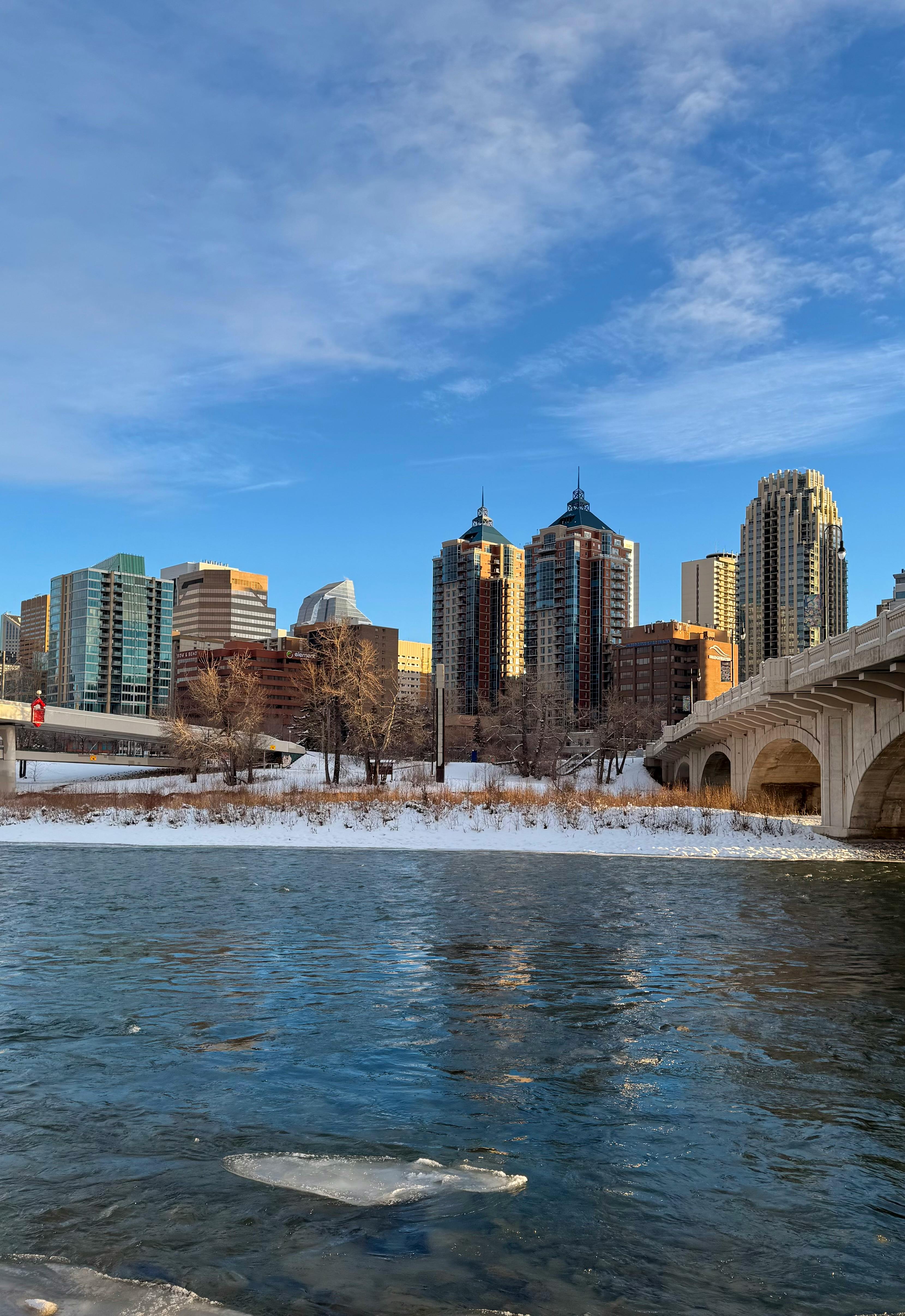Skyline of Calgary with Bow River in Winter · Free Stock Photo