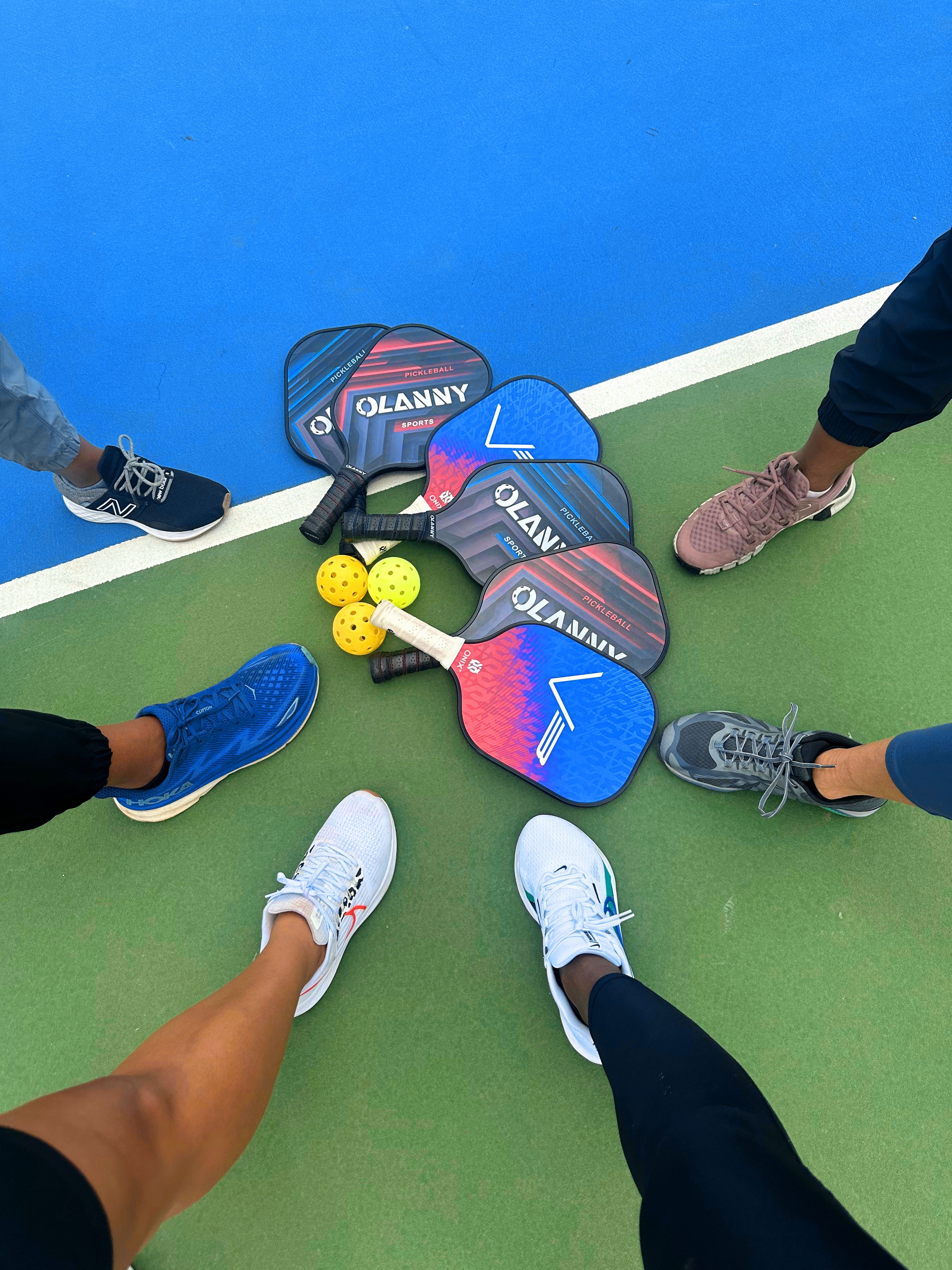 Pickleball Paddles Gathered on Court in St. George · Free Stock Photo