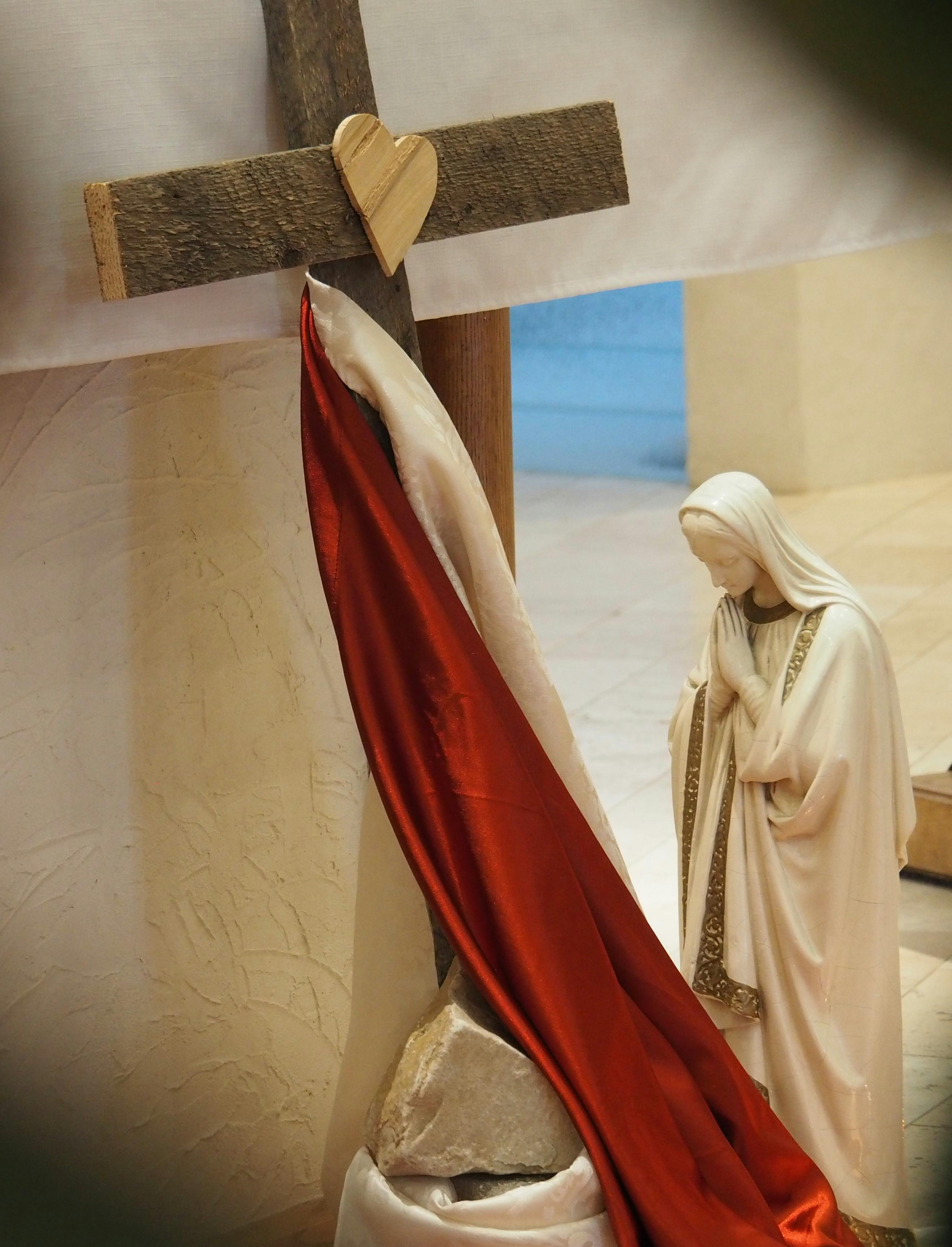 Religious Iconography with Cross and Statue · Free Stock Photo