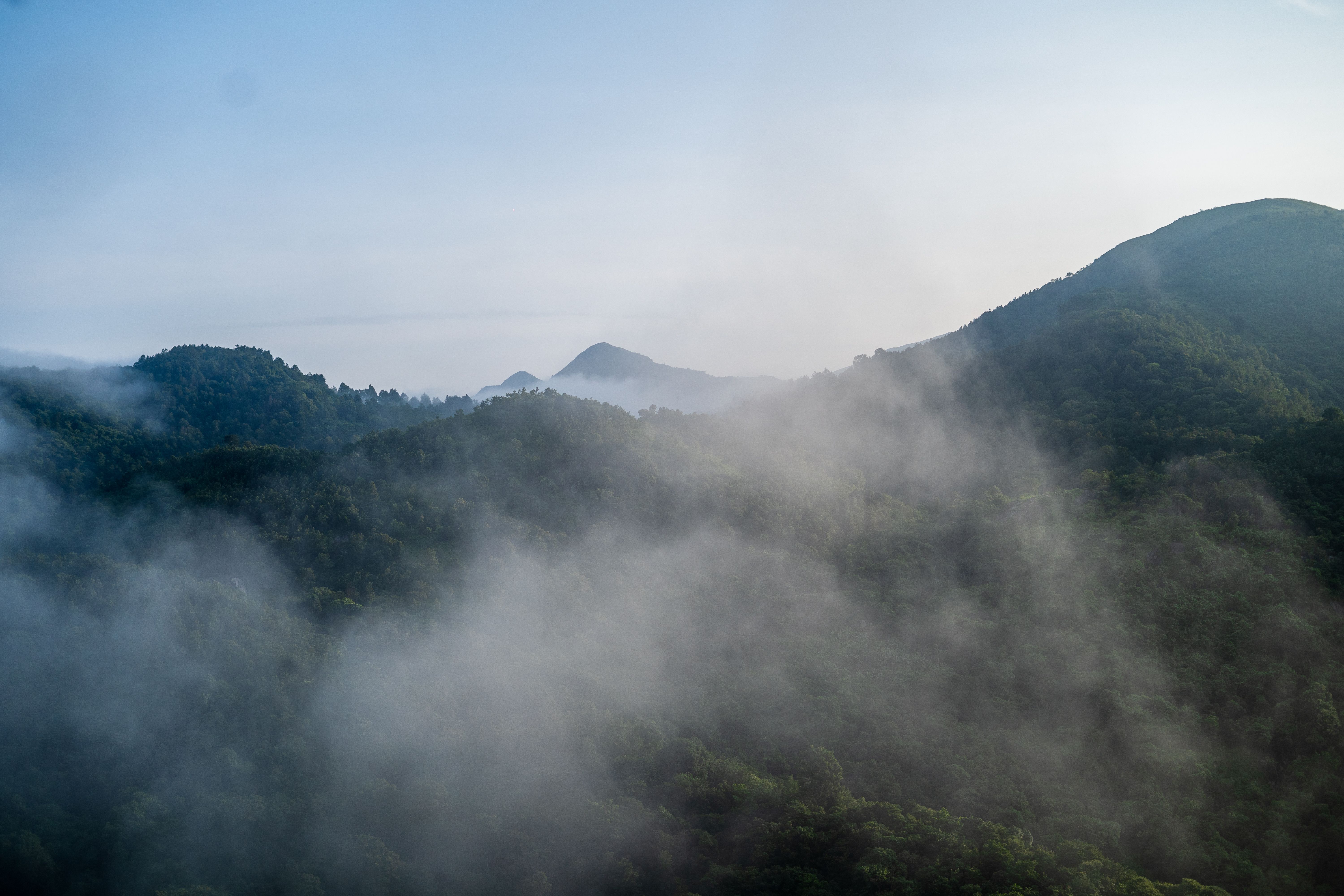 Misty Varanasi Mountains at Sunrise · Free Stock Photo