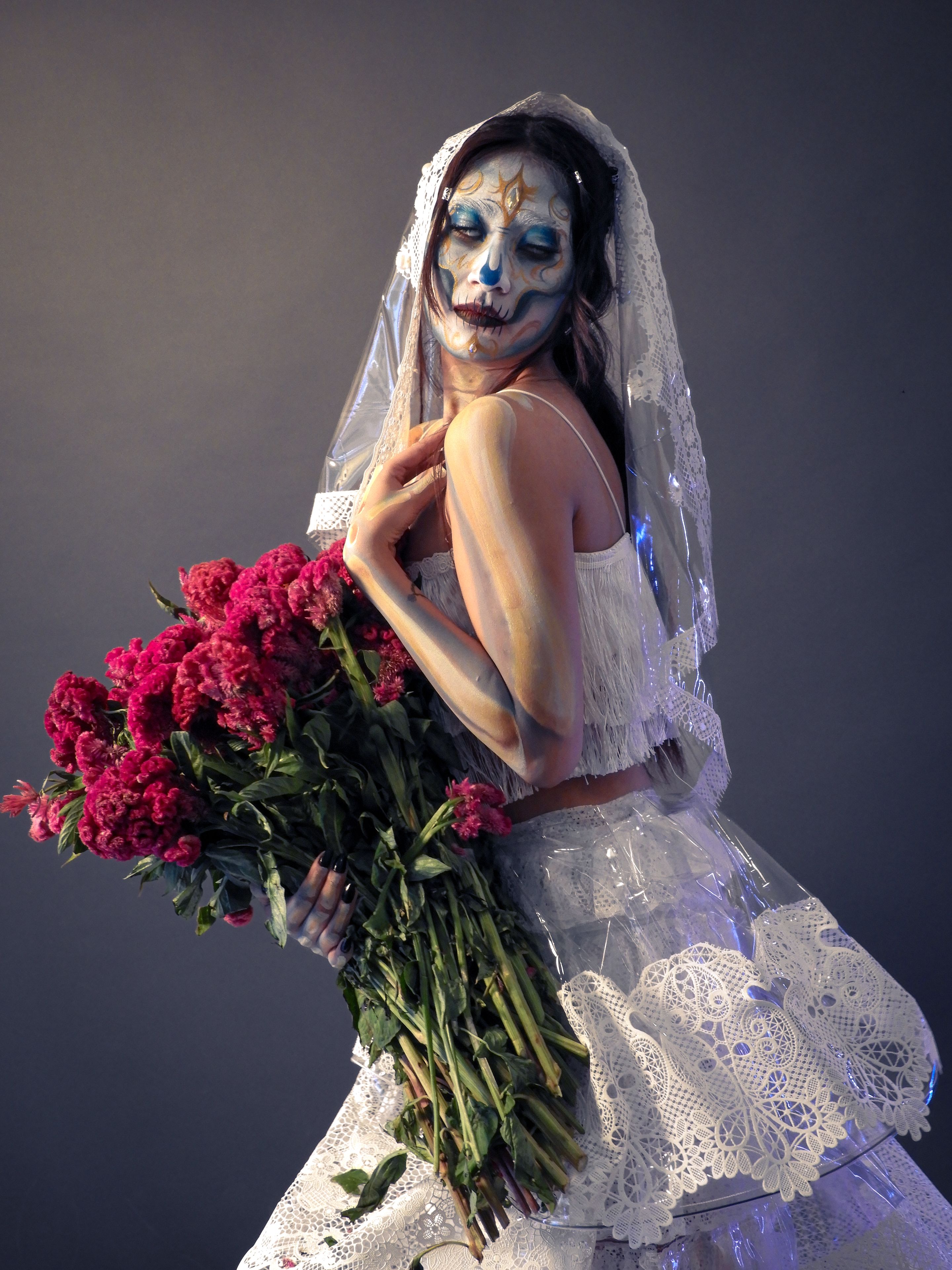 Day of the Dead Bride with Floral Bouquet · Free Stock Photo