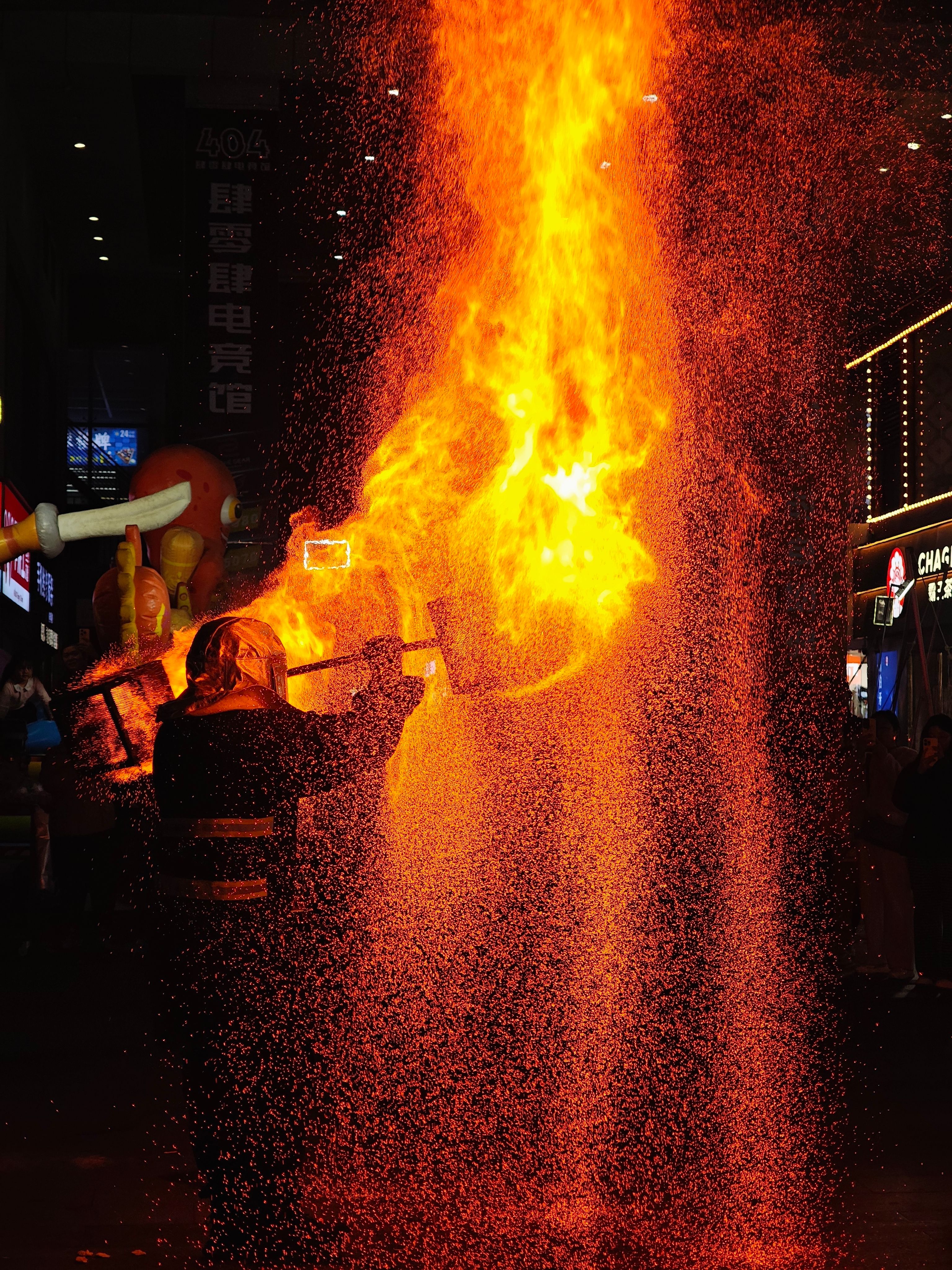 Fire Performance at Night in Urban Setting · Free Stock Photo