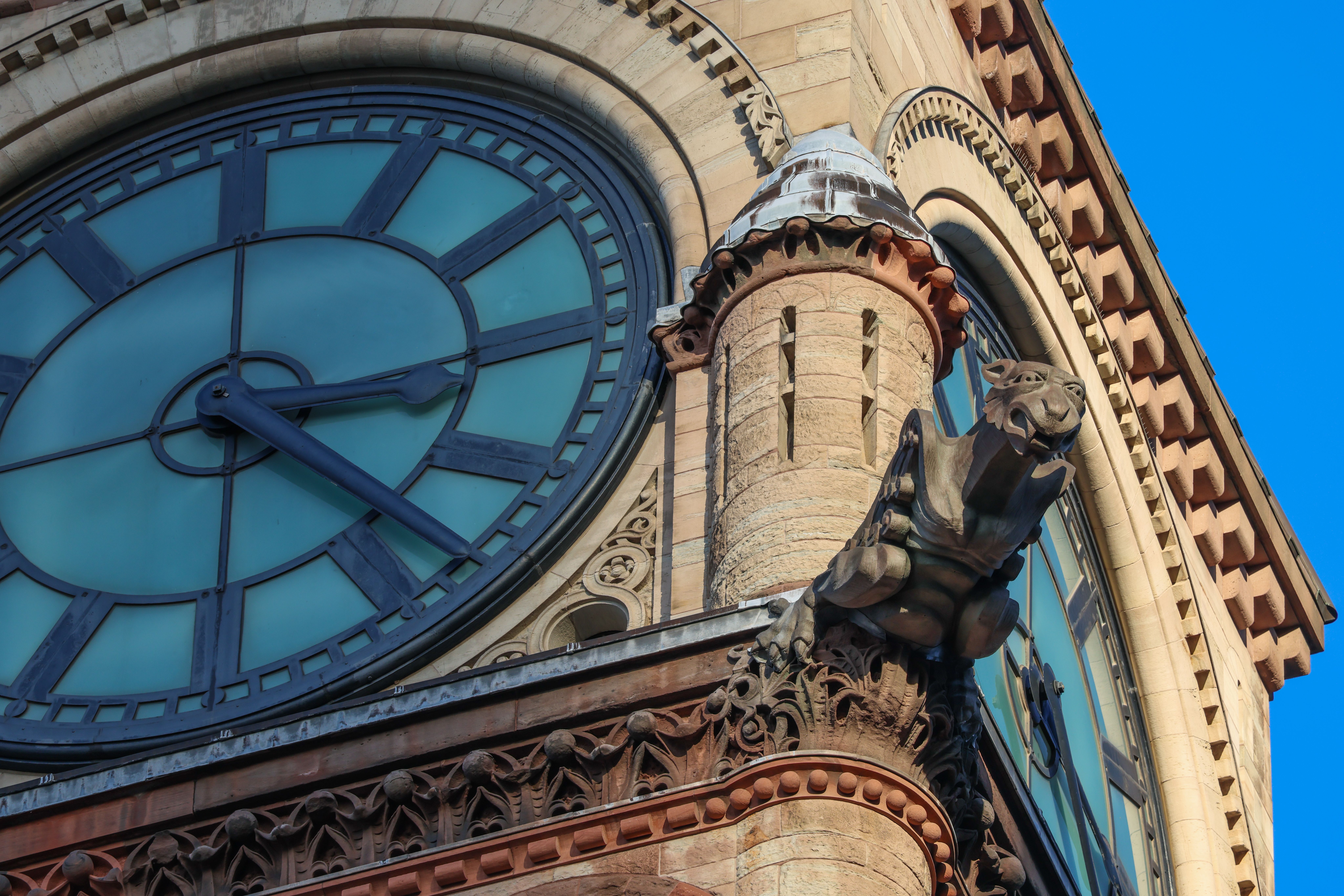 Gothic Clock Tower with Gargoyle Detail · Free Stock Photo