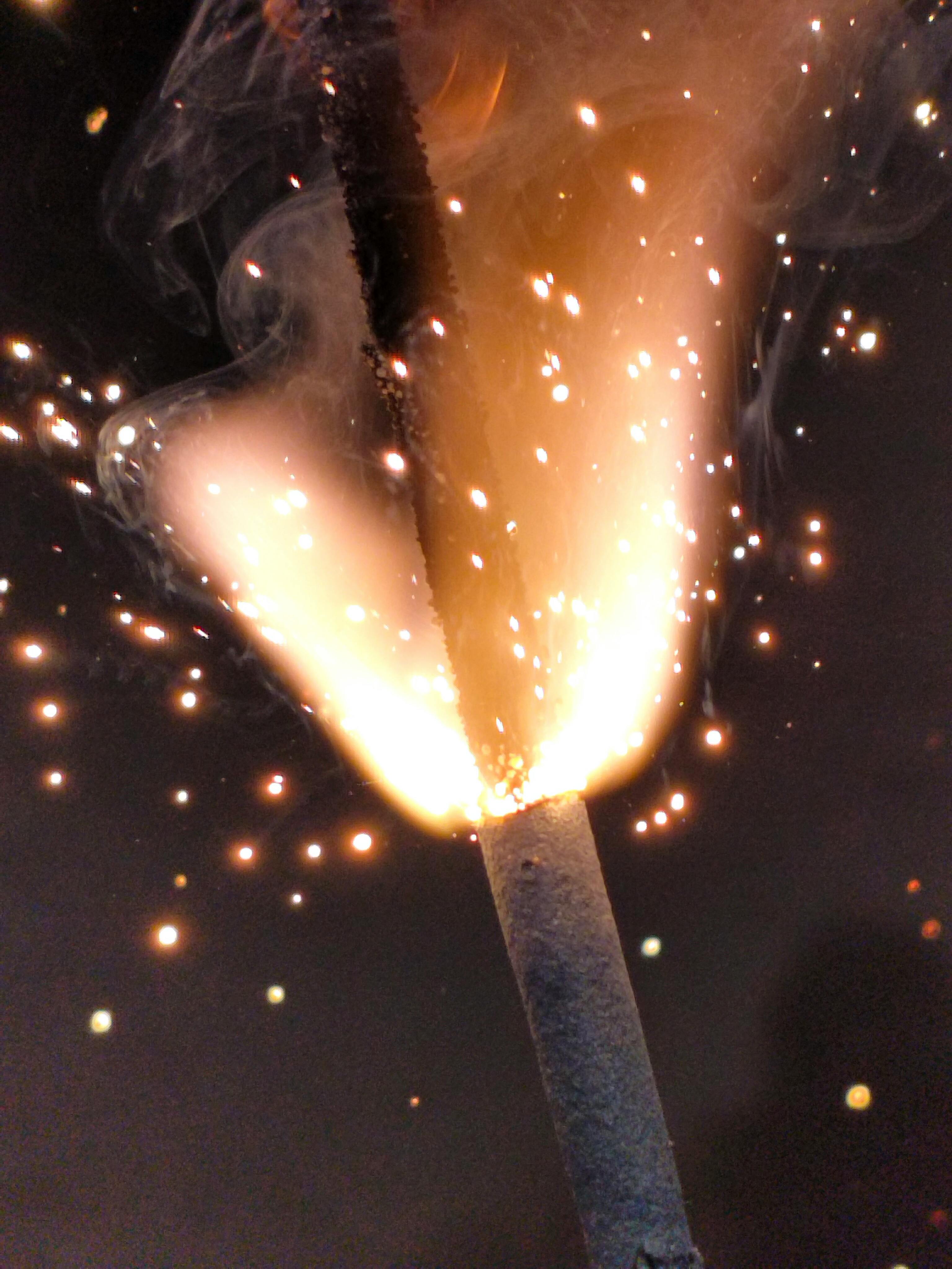Close-up of Sparkler Emitting Bright Sparks · Free Stock Photo
