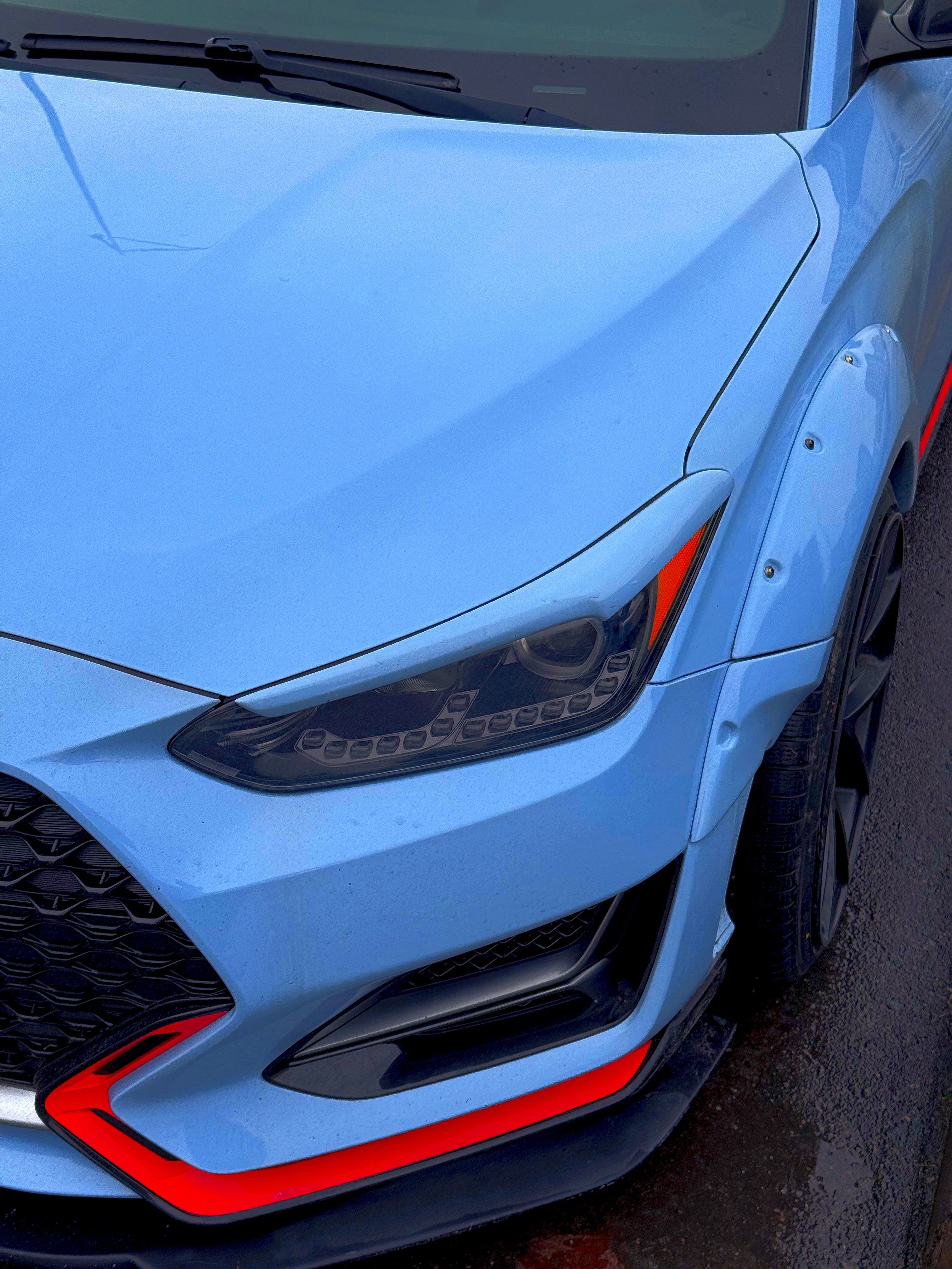 Close-up of blue sports car with accents · Free Stock Photo