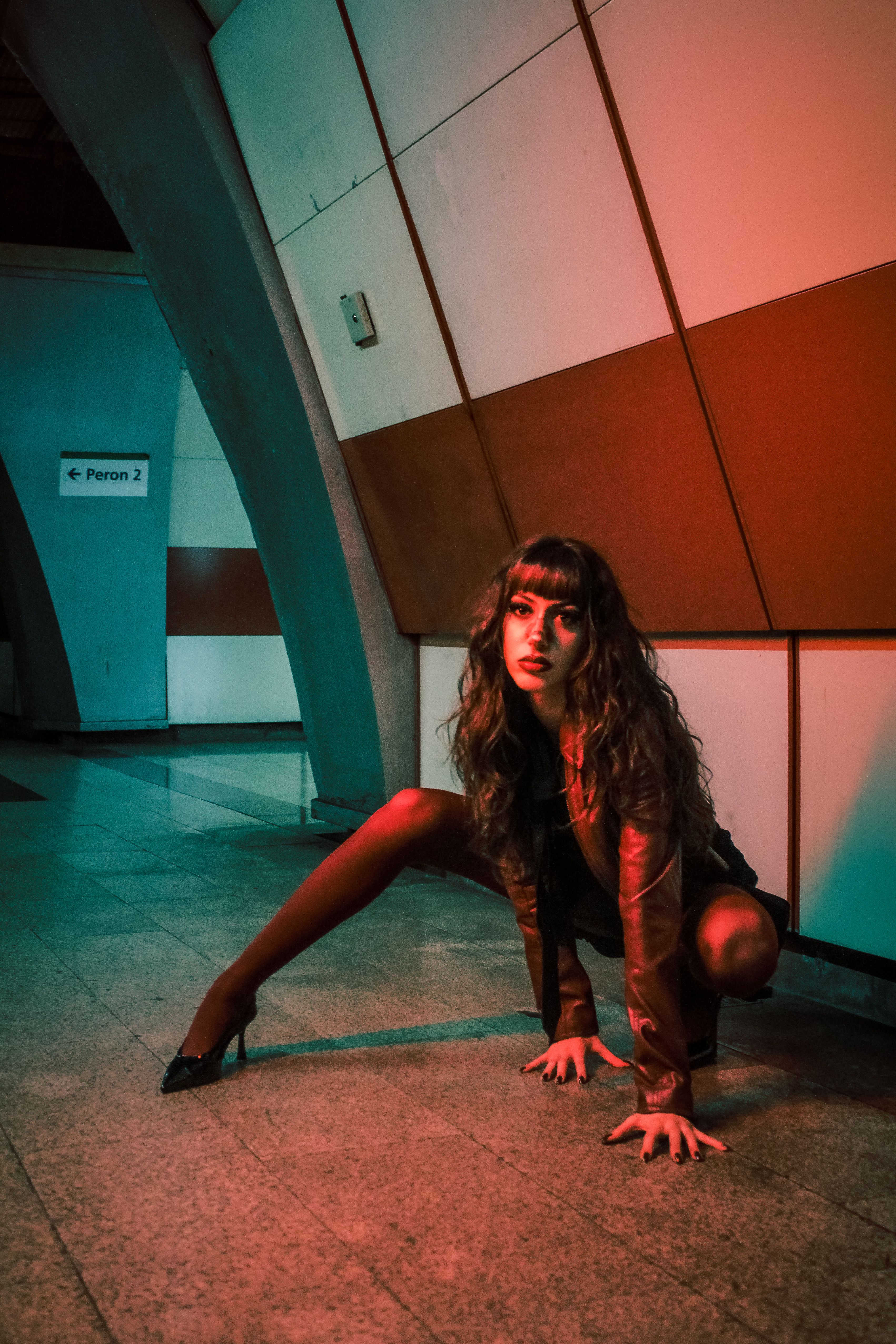 Dramatic Pose in Urban Subway Setting · Free Stock Photo