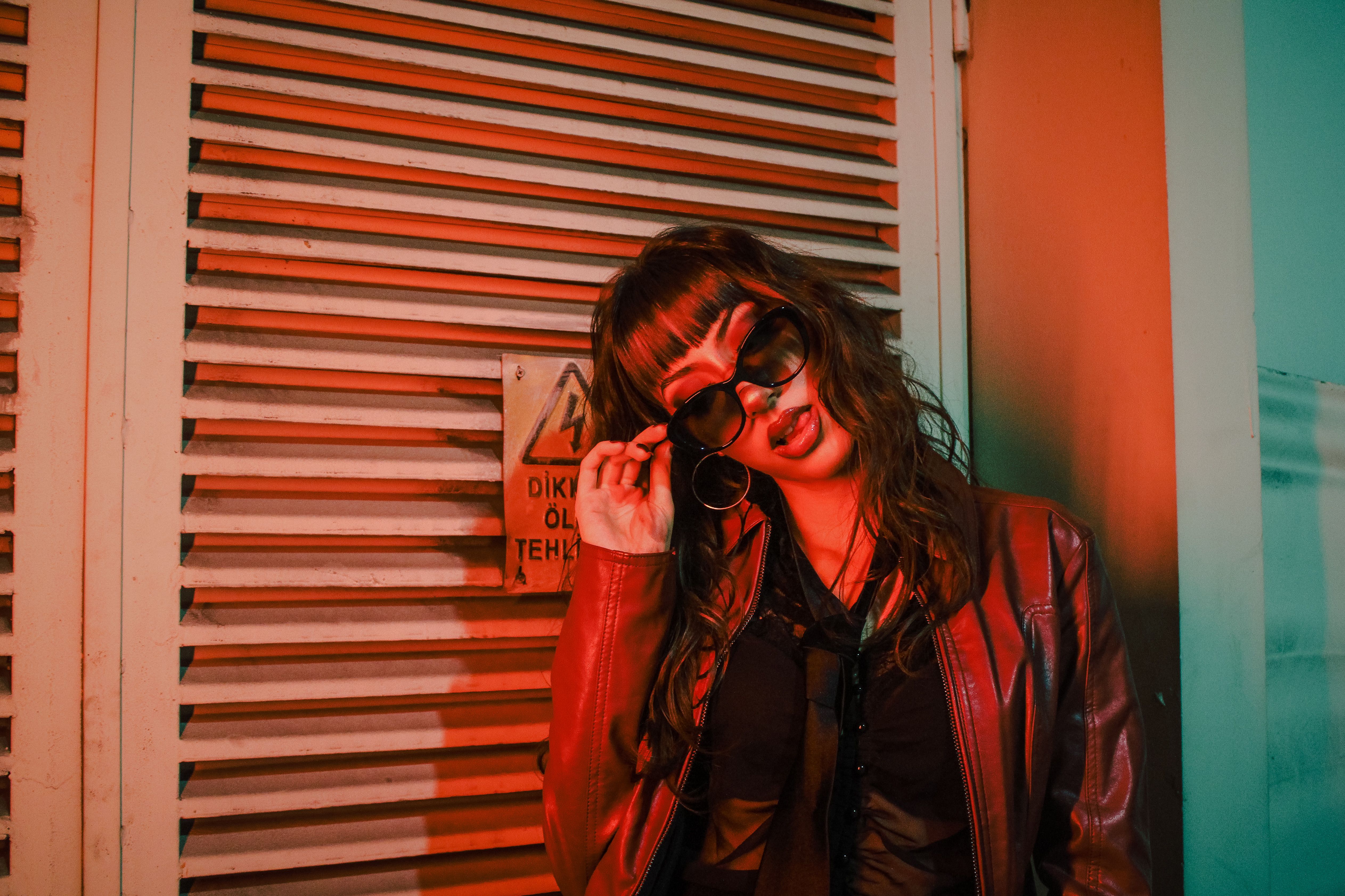 Stylish Woman in Red Jacket with Sunglasses · Free Stock Photo