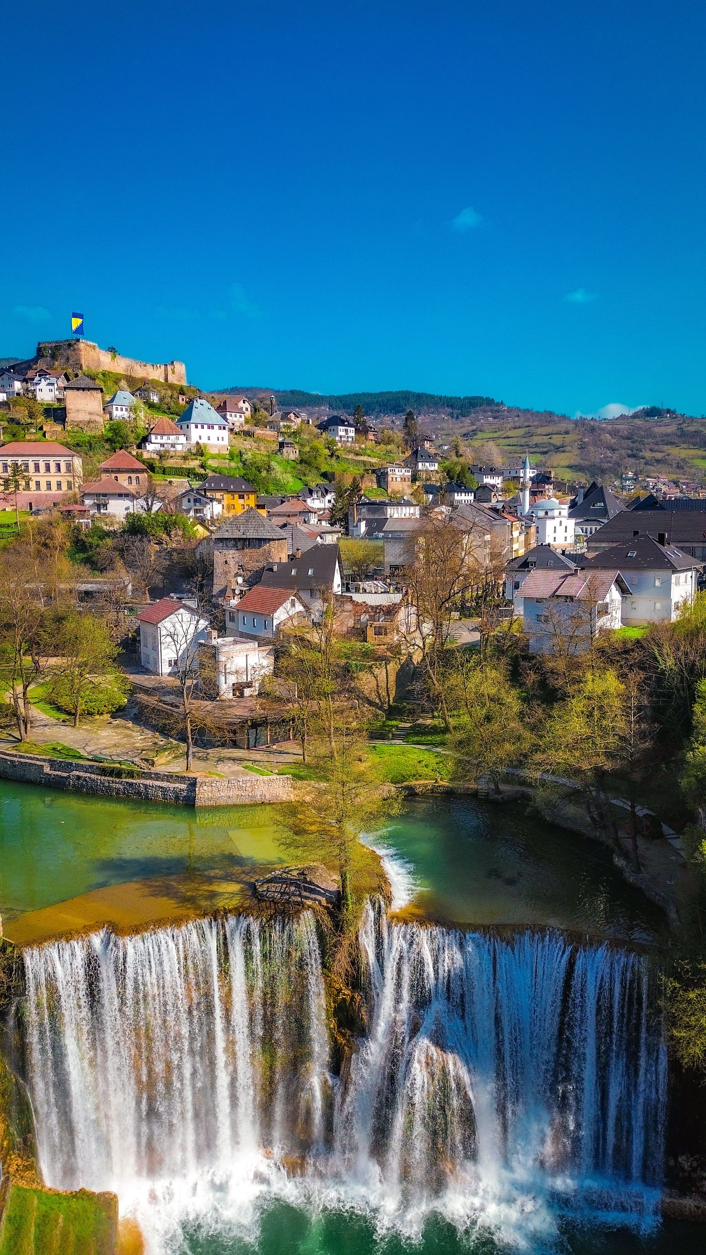Scenic View of Jajce Town with Pliva Waterfall · Free Stock Photo
