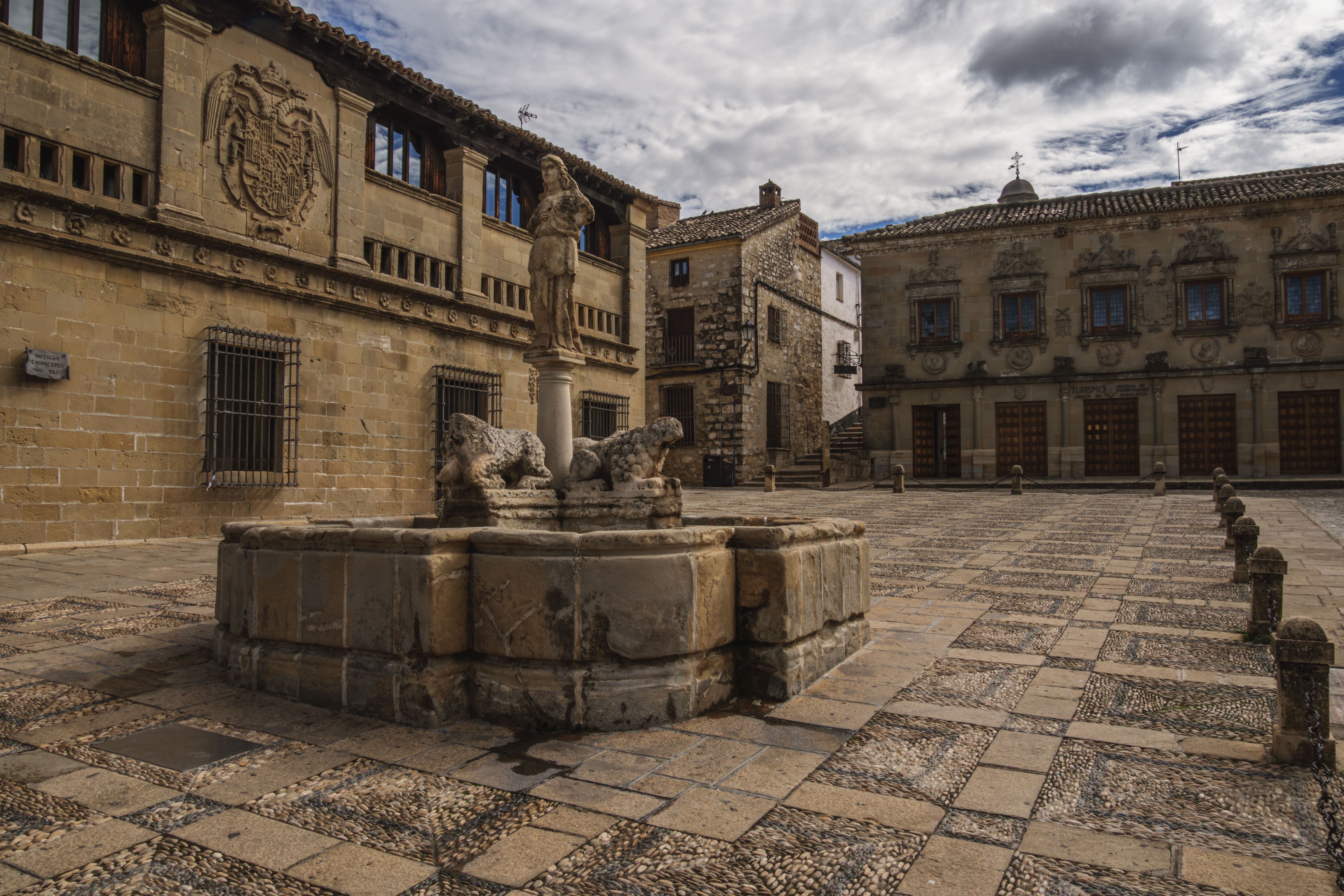 Historic European Plaza with Ancient Fountain · Free Stock Photo