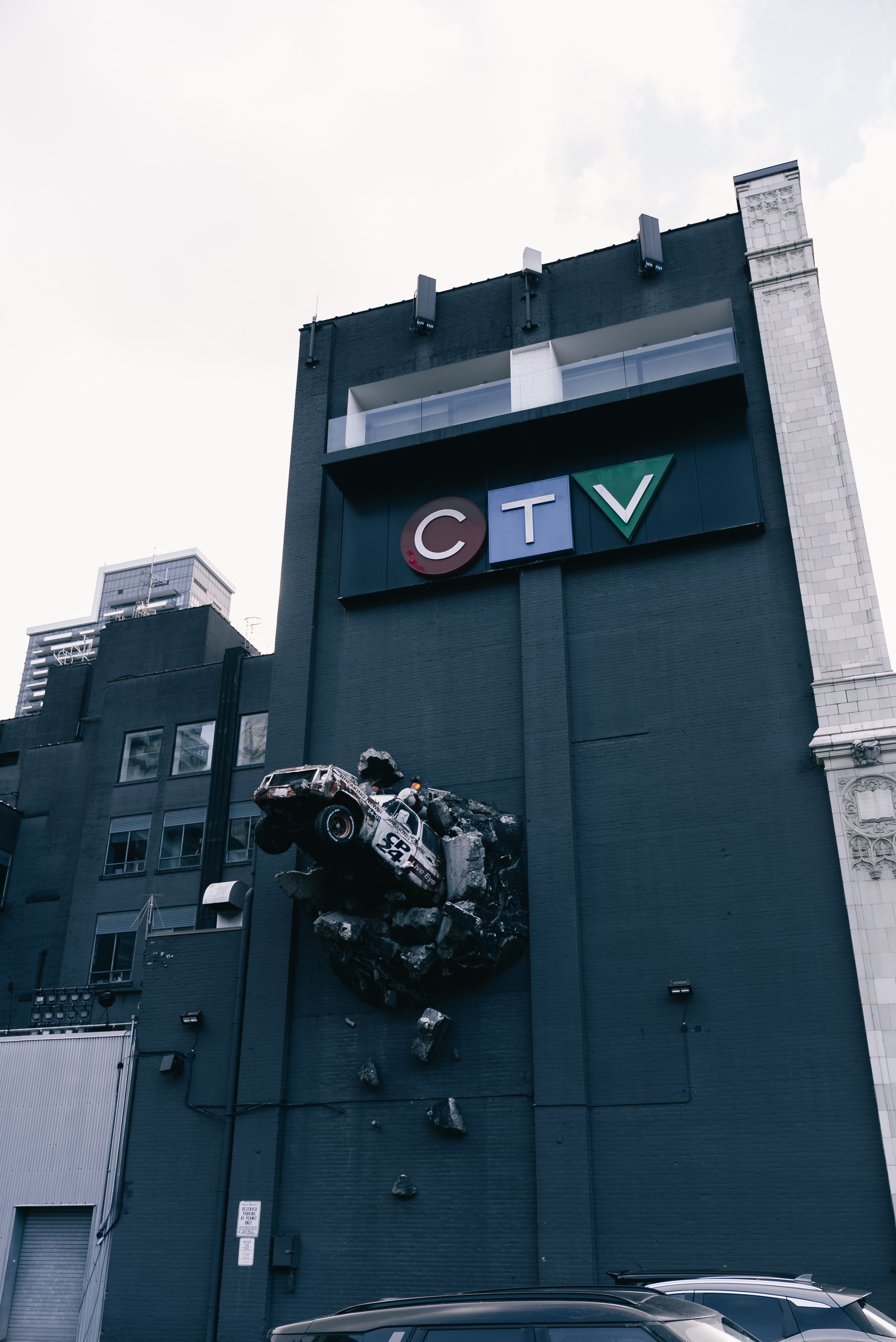 CTV Building with Art Installation in Cityscape · Free Stock Photo