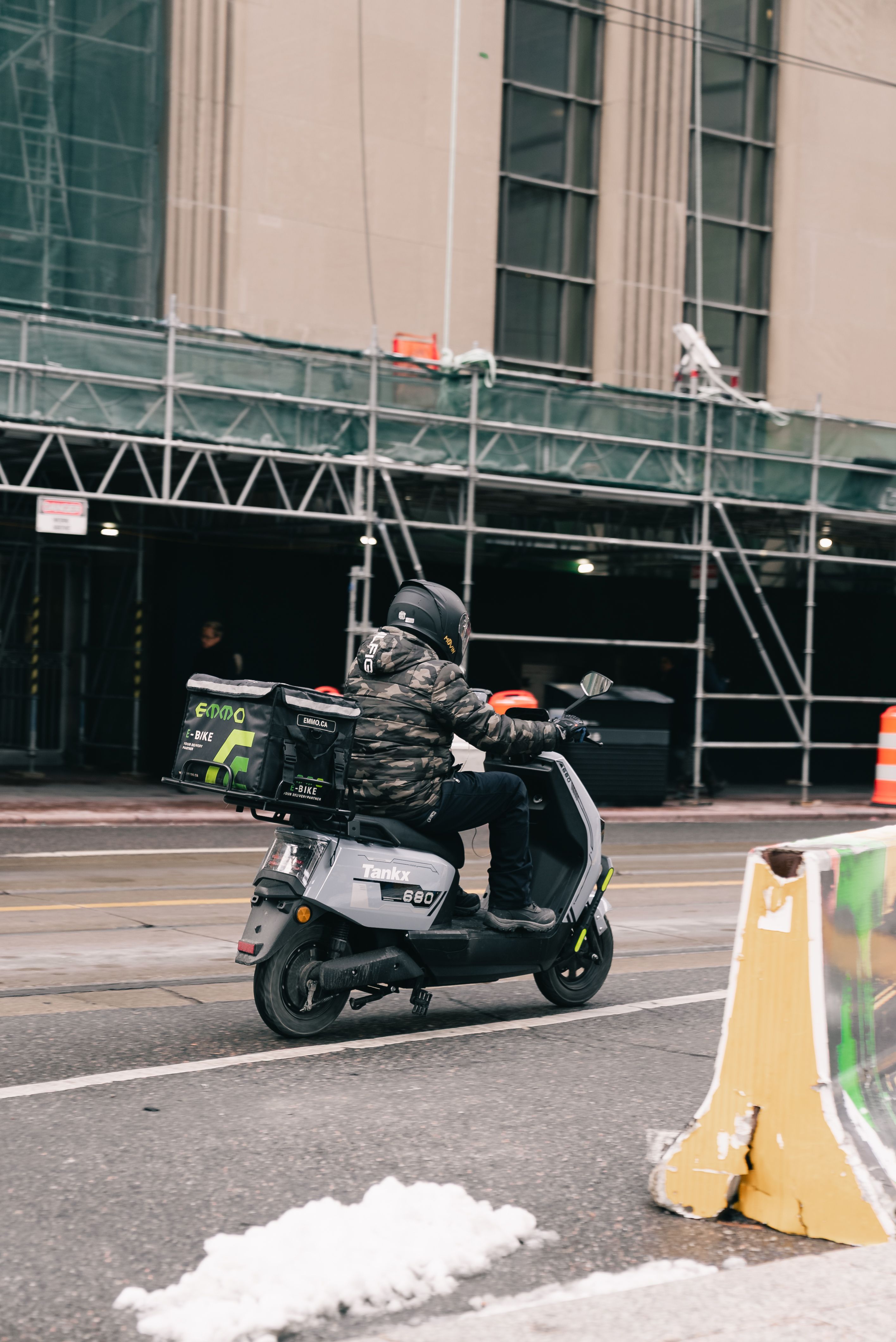 Urban Delivery Scooter on City Street · Free Stock Photo