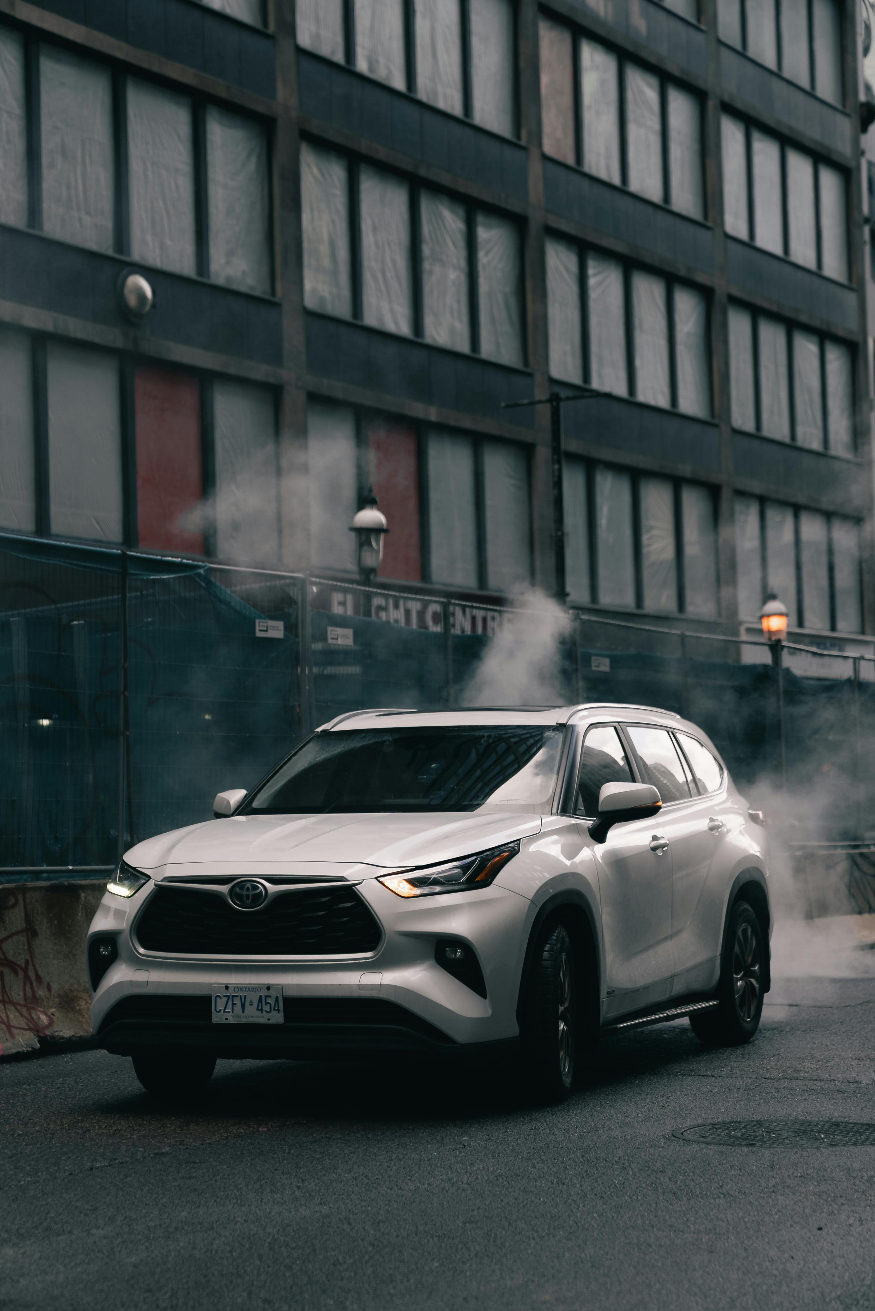 Parked White Coupe during Night · Free Stock Photo