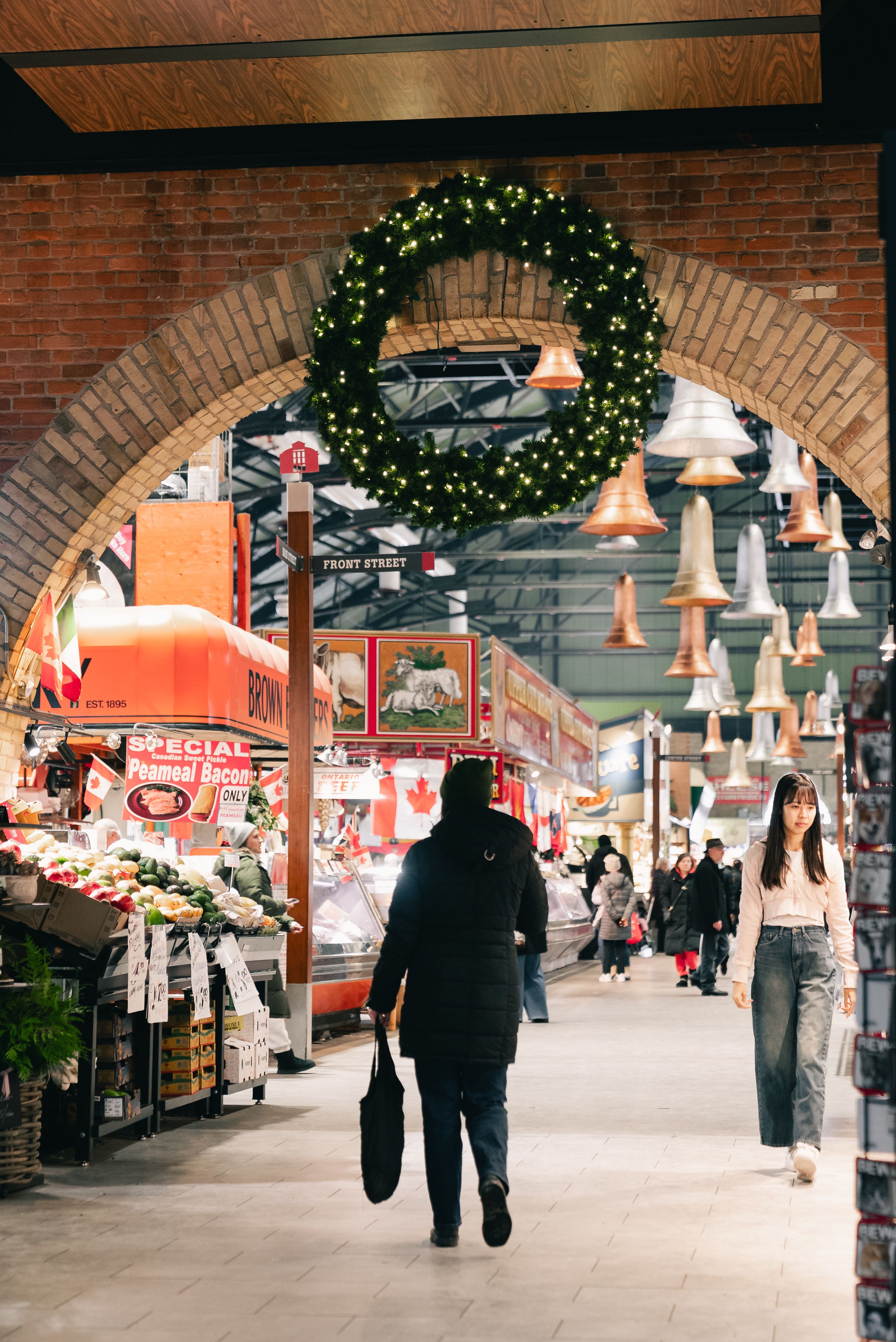 Festive Holiday Shopping at Indoor Market · Free Stock Photo
