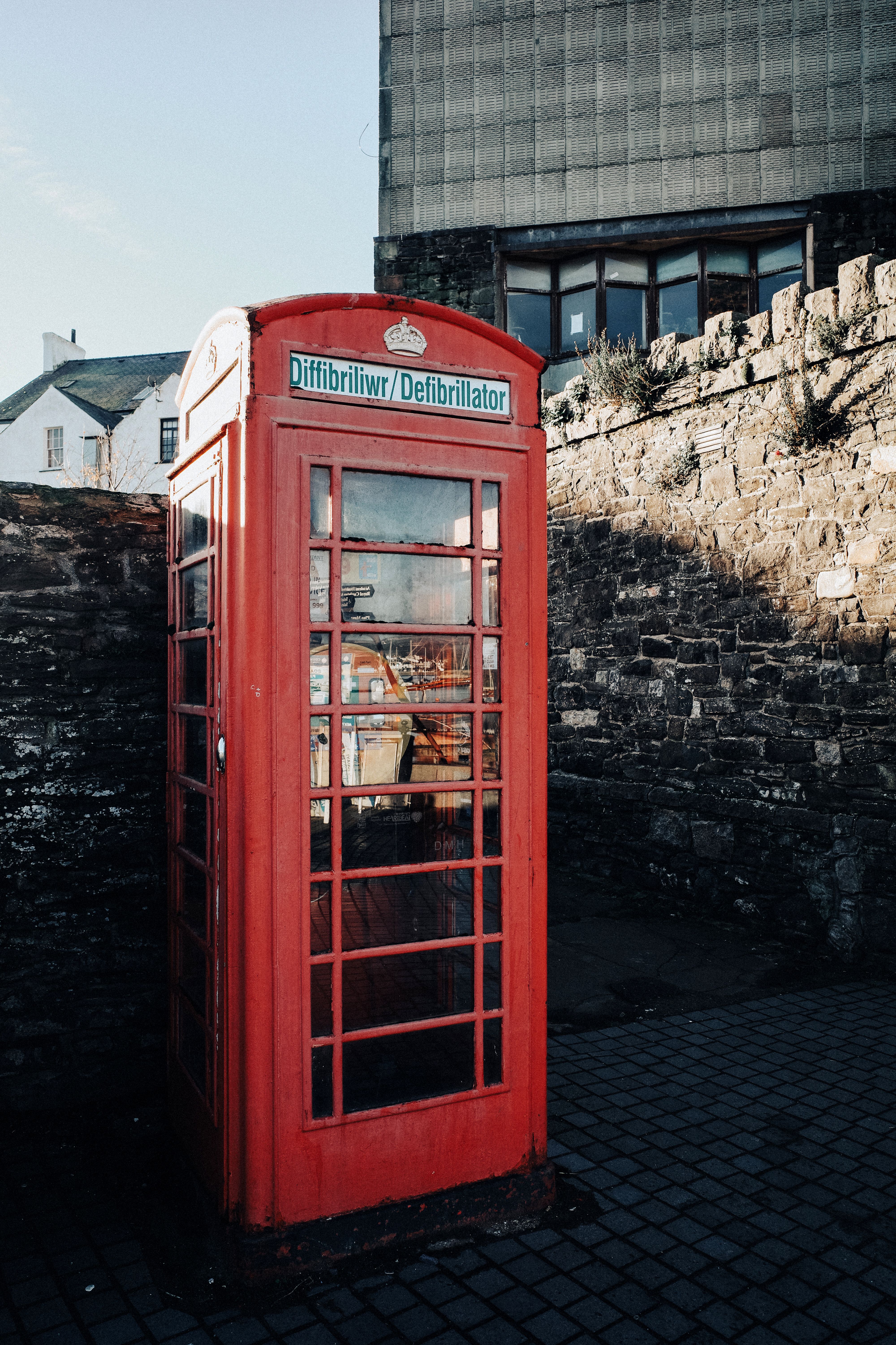 Red British Phone Booth with Defibrillator in Conwy · meta.free_stock.photo