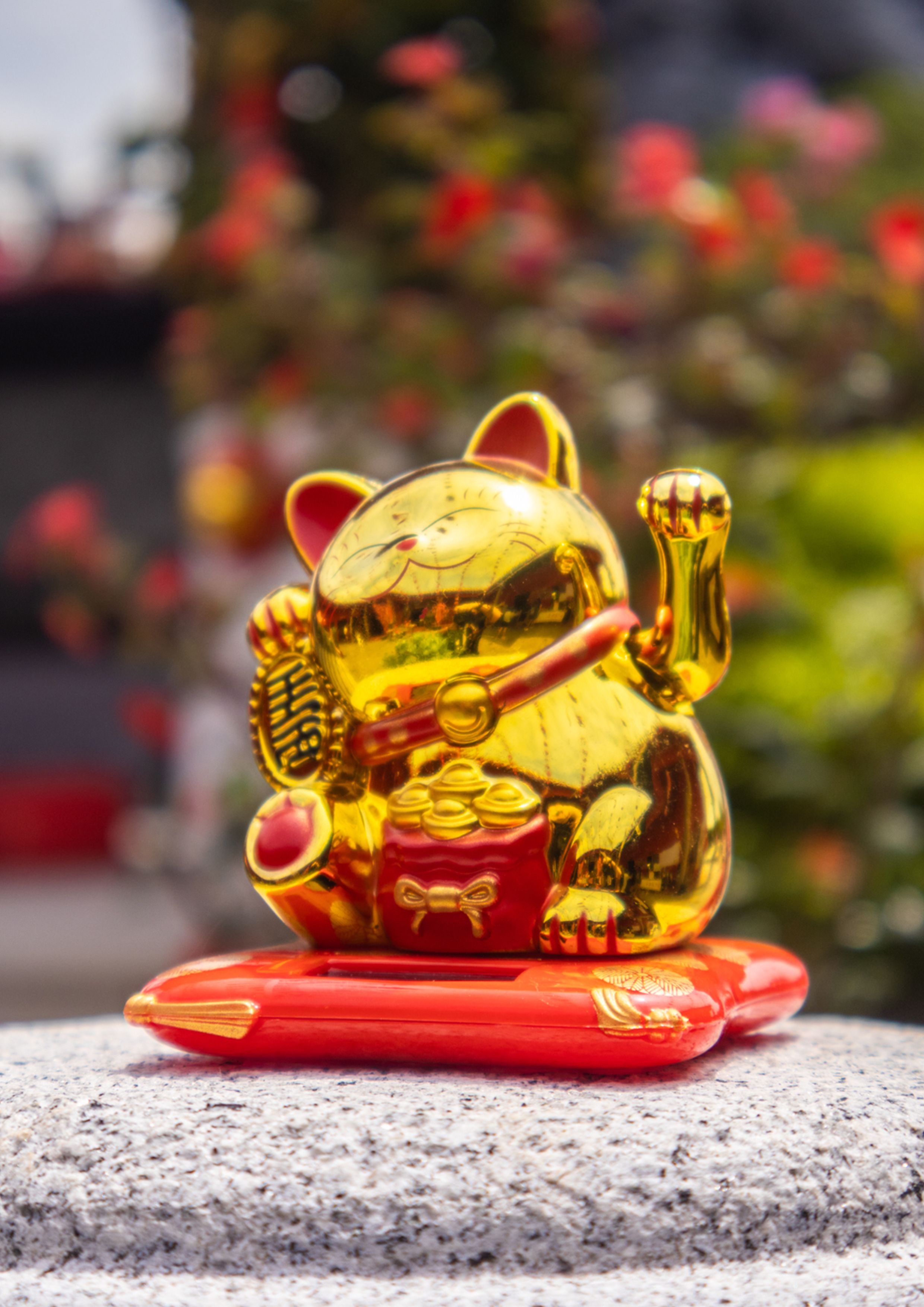 Golden Maneki Neko Statue Outdoors · Free Stock Photo