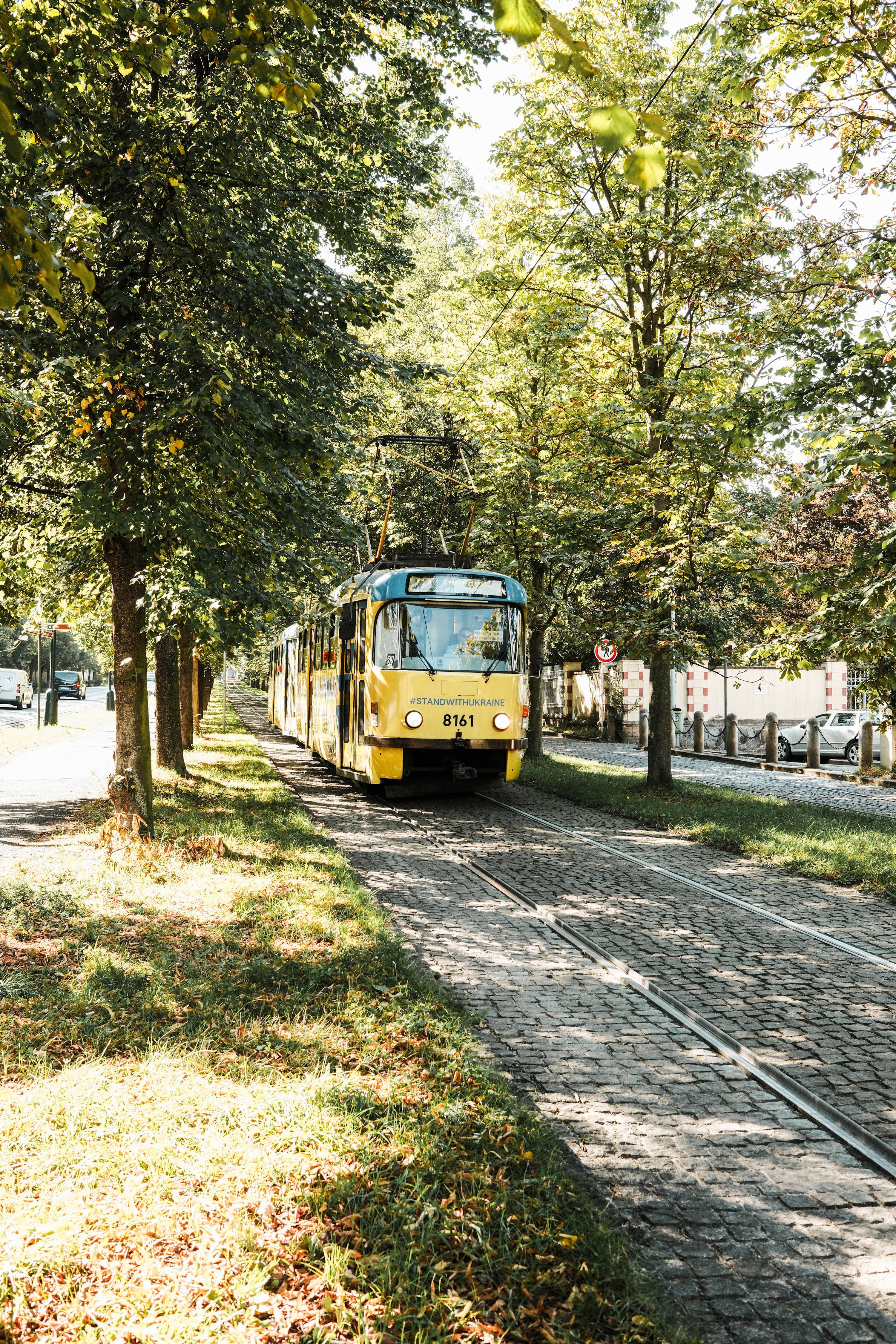 Classic Yellow Tram in Prague During Daytime · Free Stock Photo