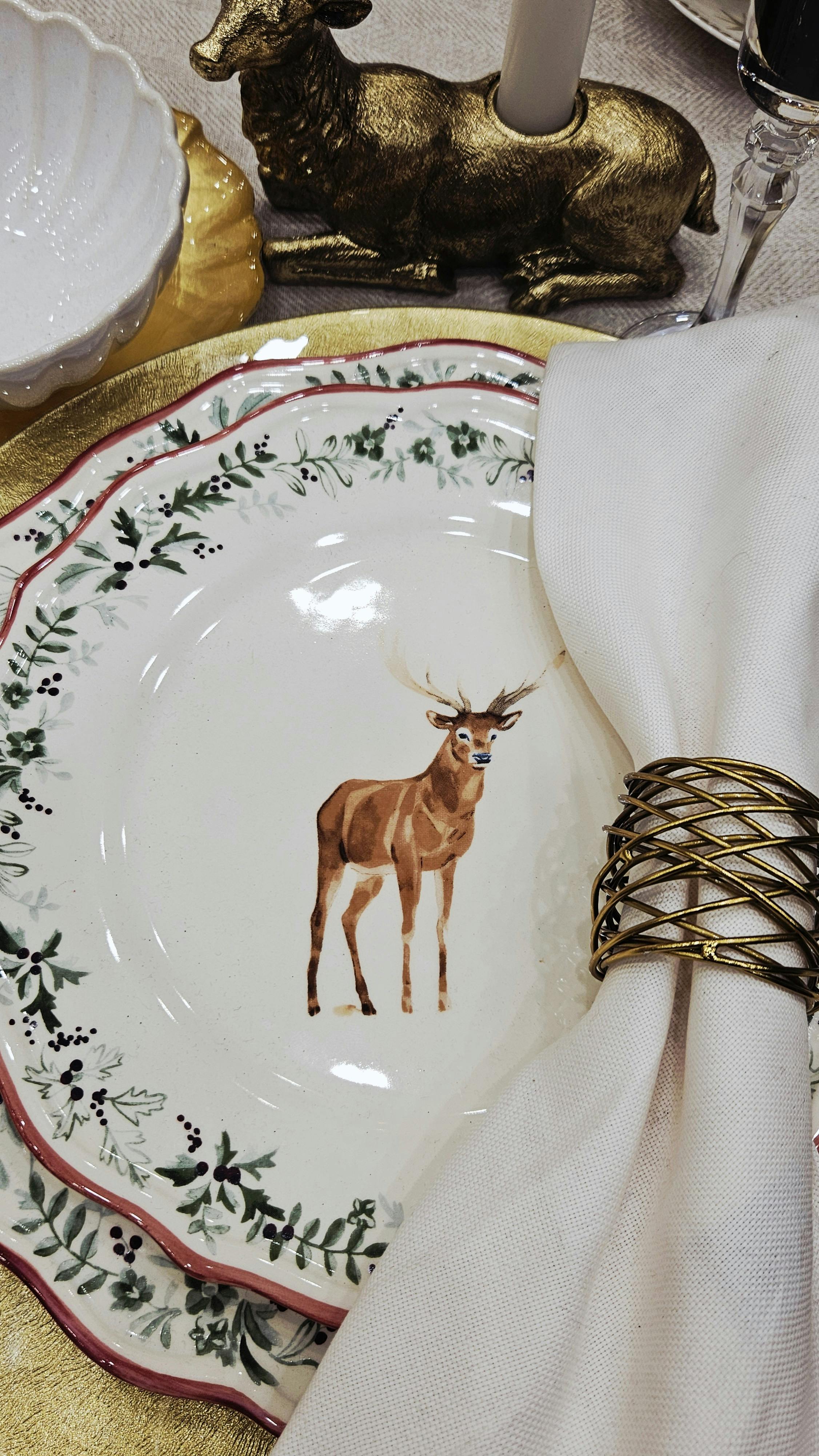 Elegant Deer-themed Holiday Dinnerware Setup · Free Stock Photo