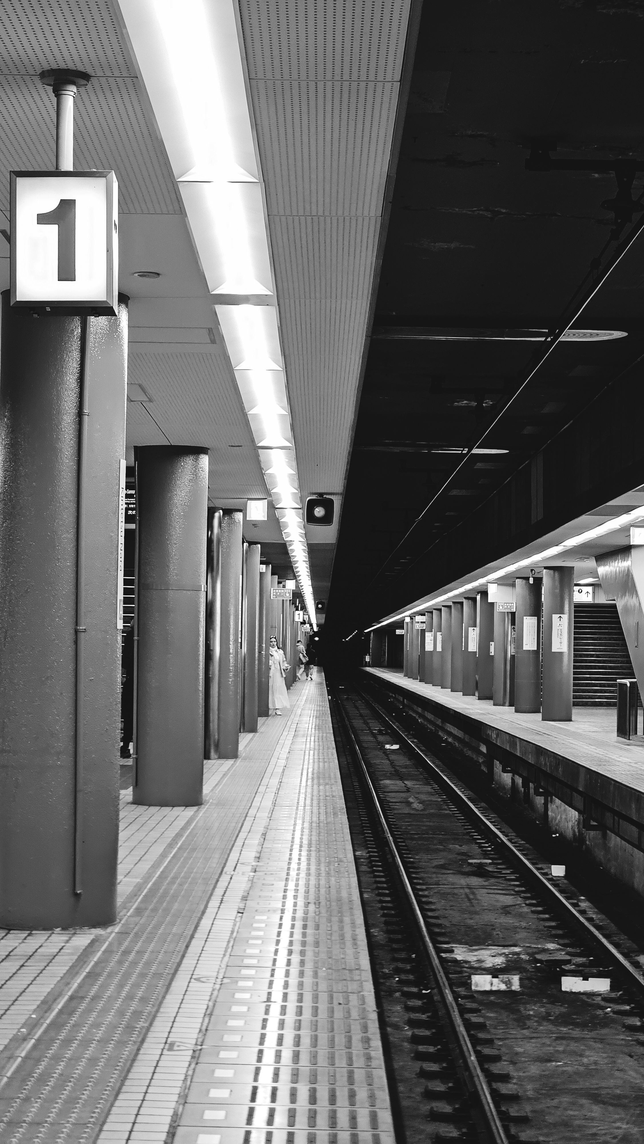 Black and White Subway Station Platform Perspective · Free Stock Photo