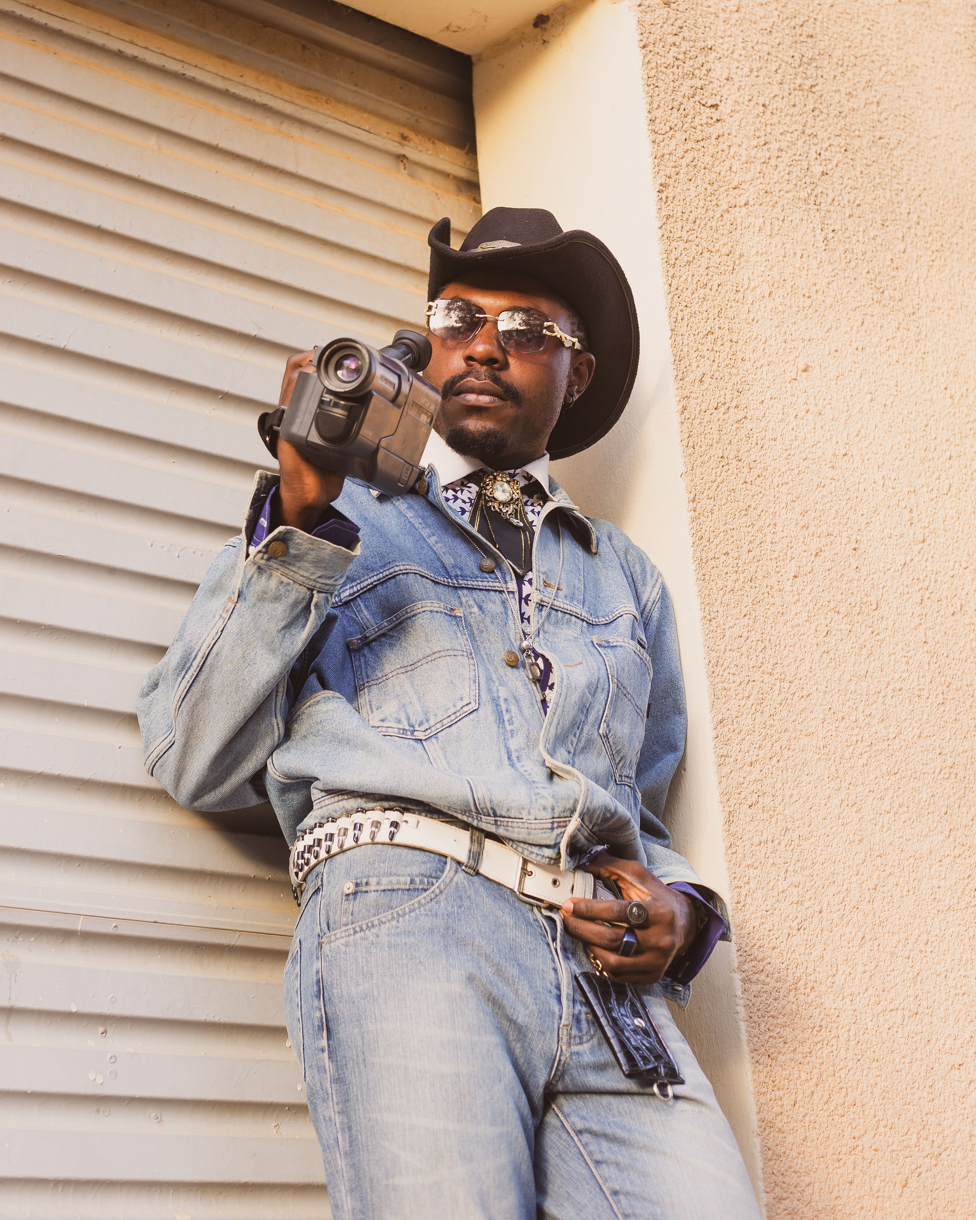 Stylish Retro Cowboy with Video Camera Urban Fashion · Free Stock Photo