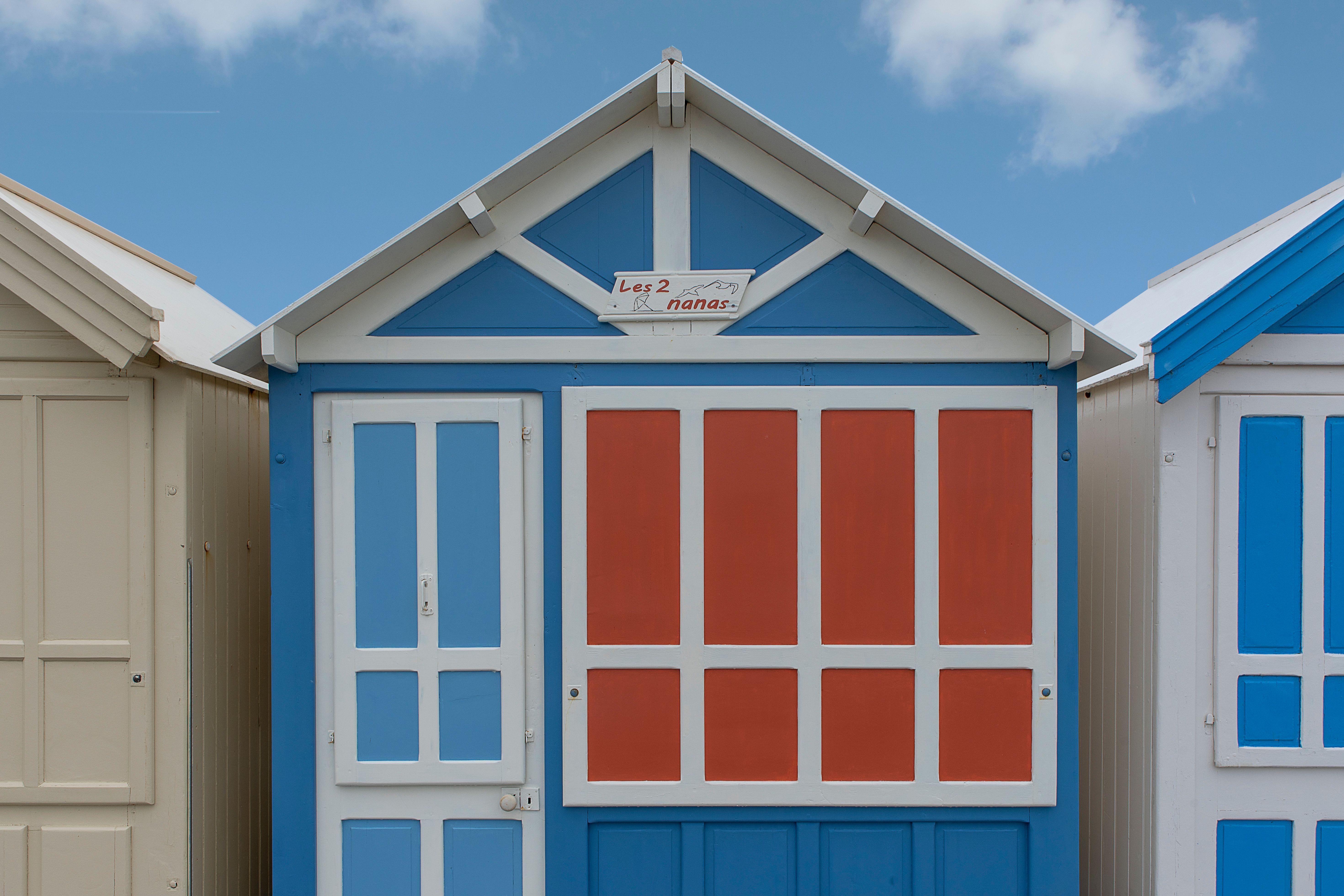 Colorful Beach Hut Front with Red and Blue Panels · Free Stock Photo